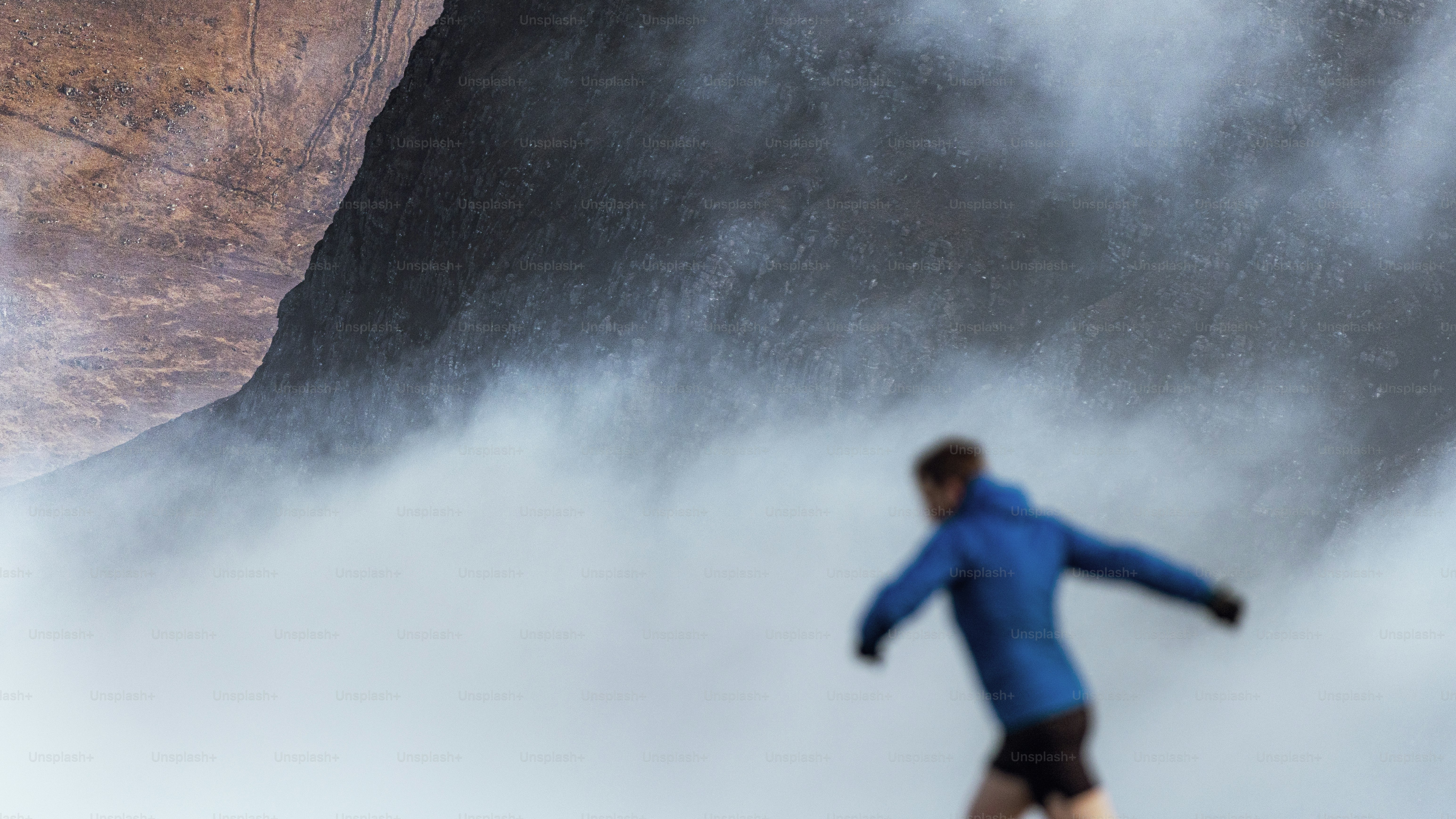 Man runs past the misty waterfall. photo – Wallpaper Image on Unsplash