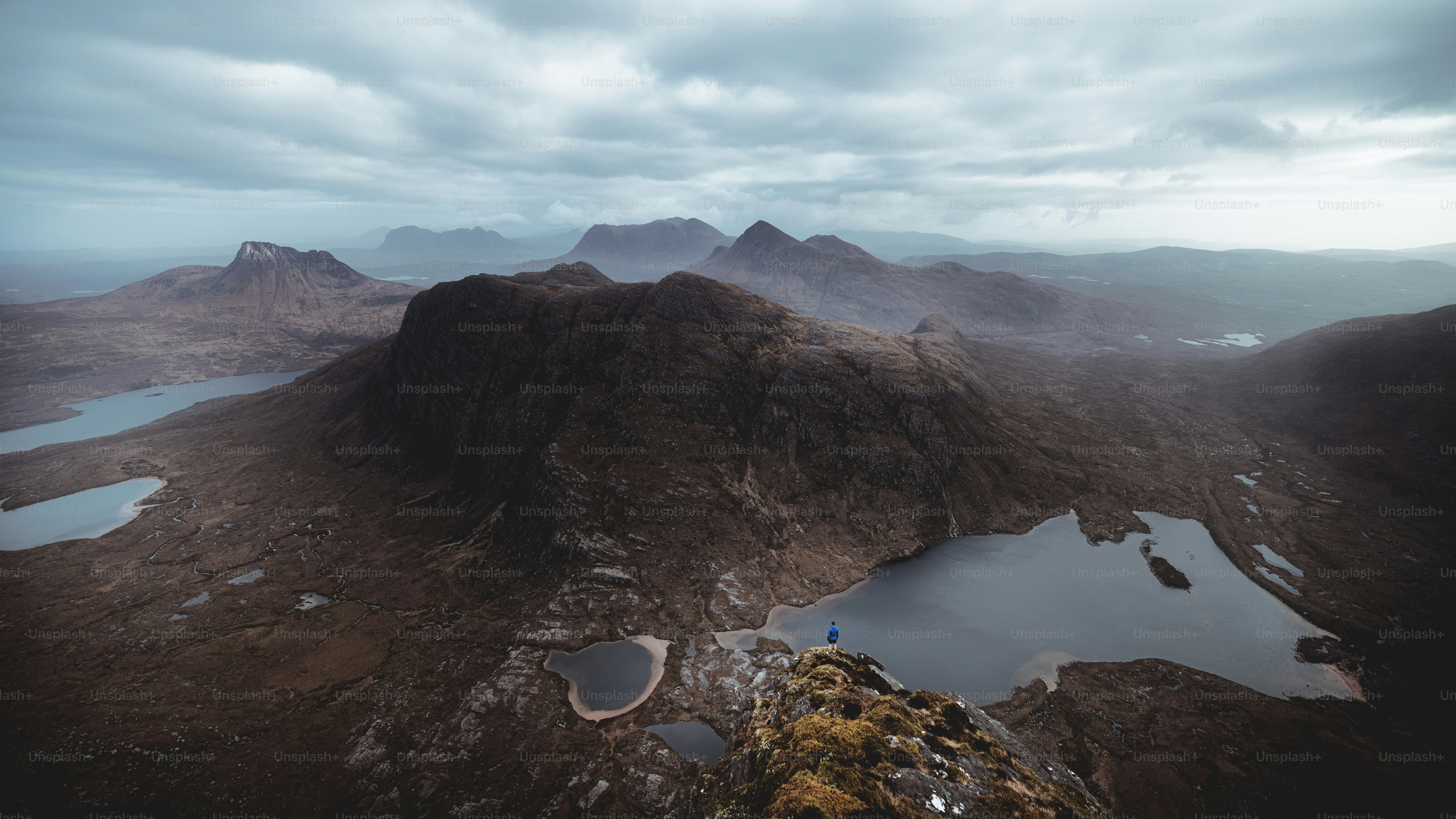 Dramatic mountains rise above several lakes. photo – Wallpaper Image on ...