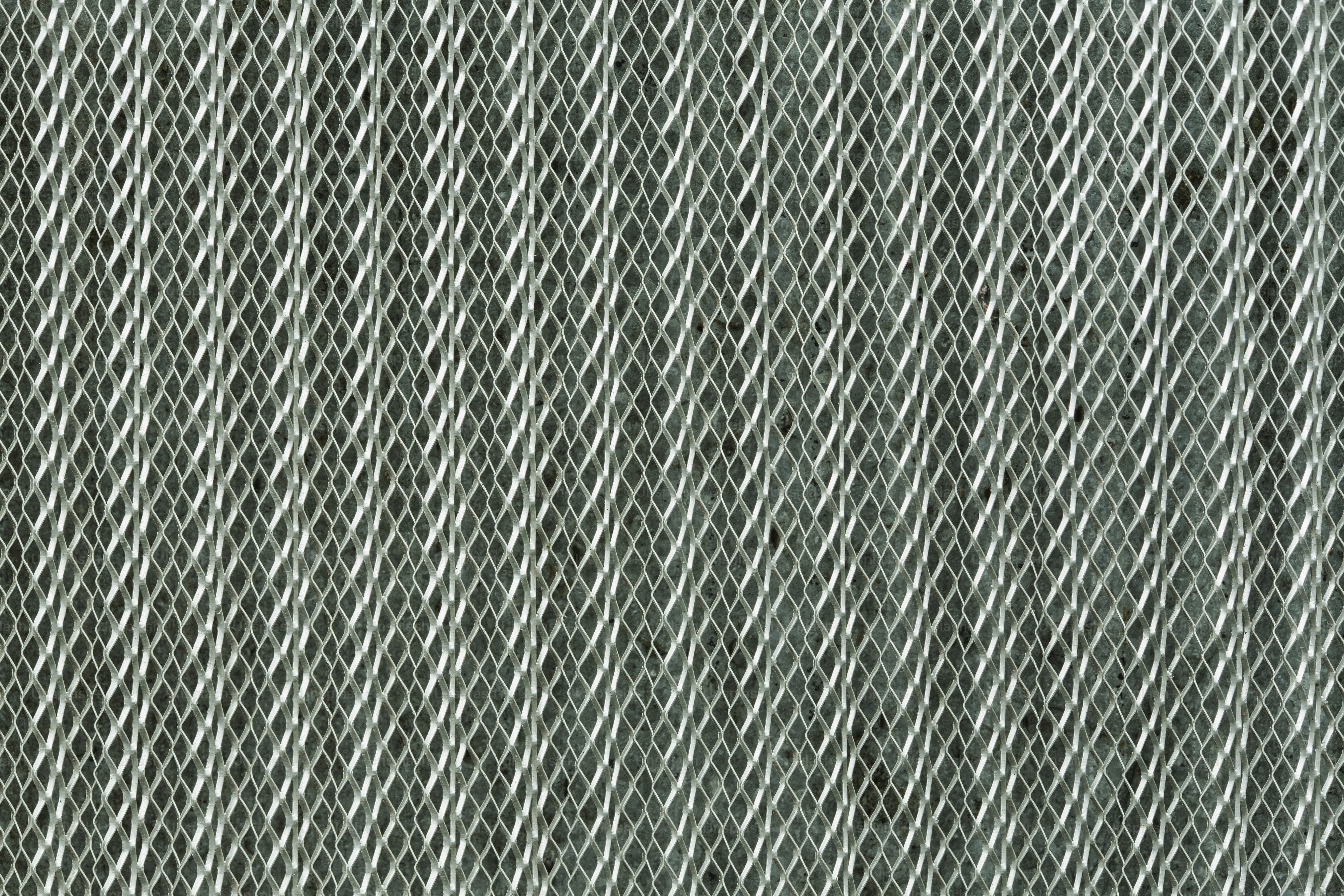 A detailed close-up of metal mesh. photo – Texture Image on Unsplash