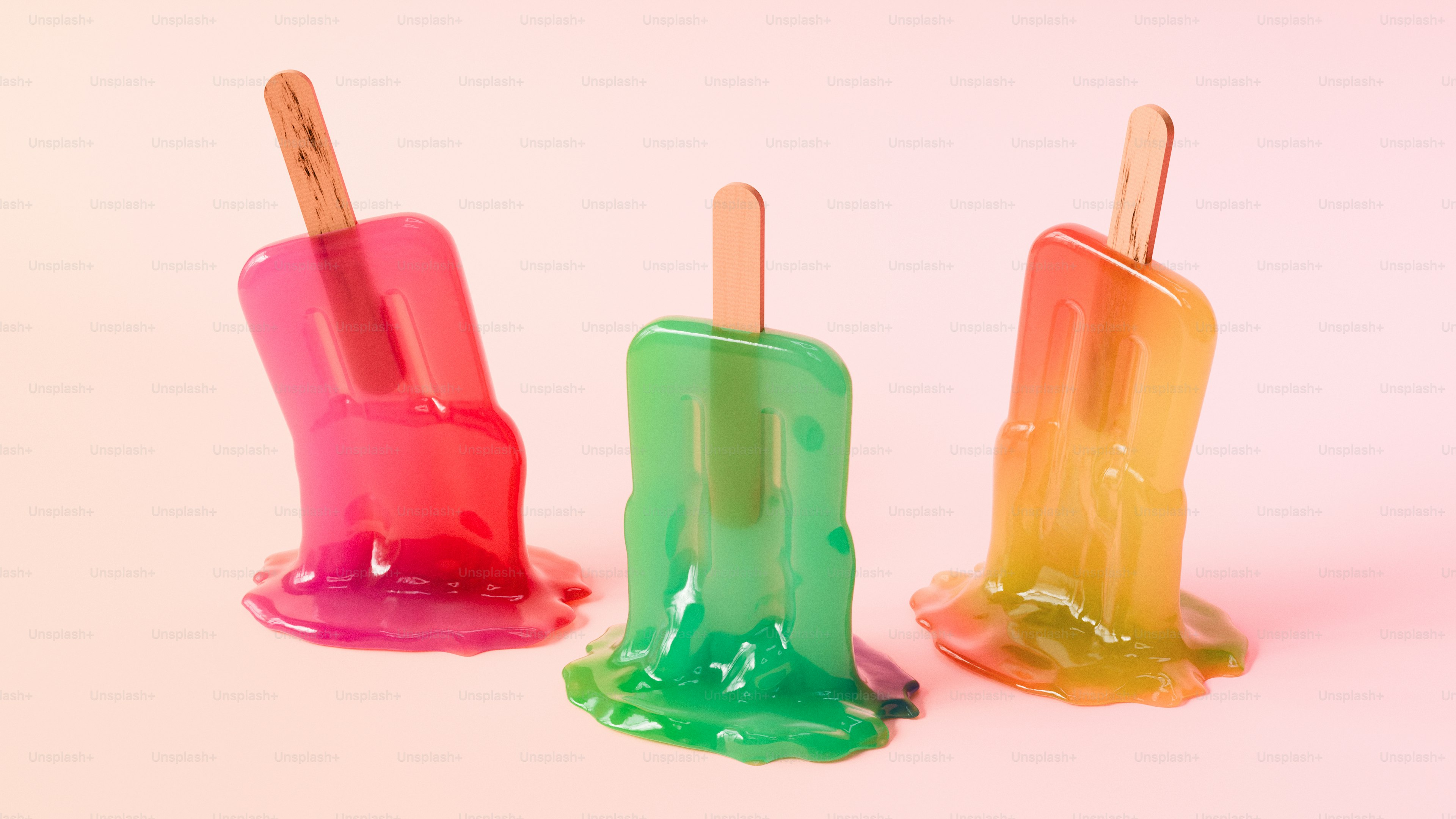Melting popsicles are displayed in colorful hues. photo – Food Image on ...
