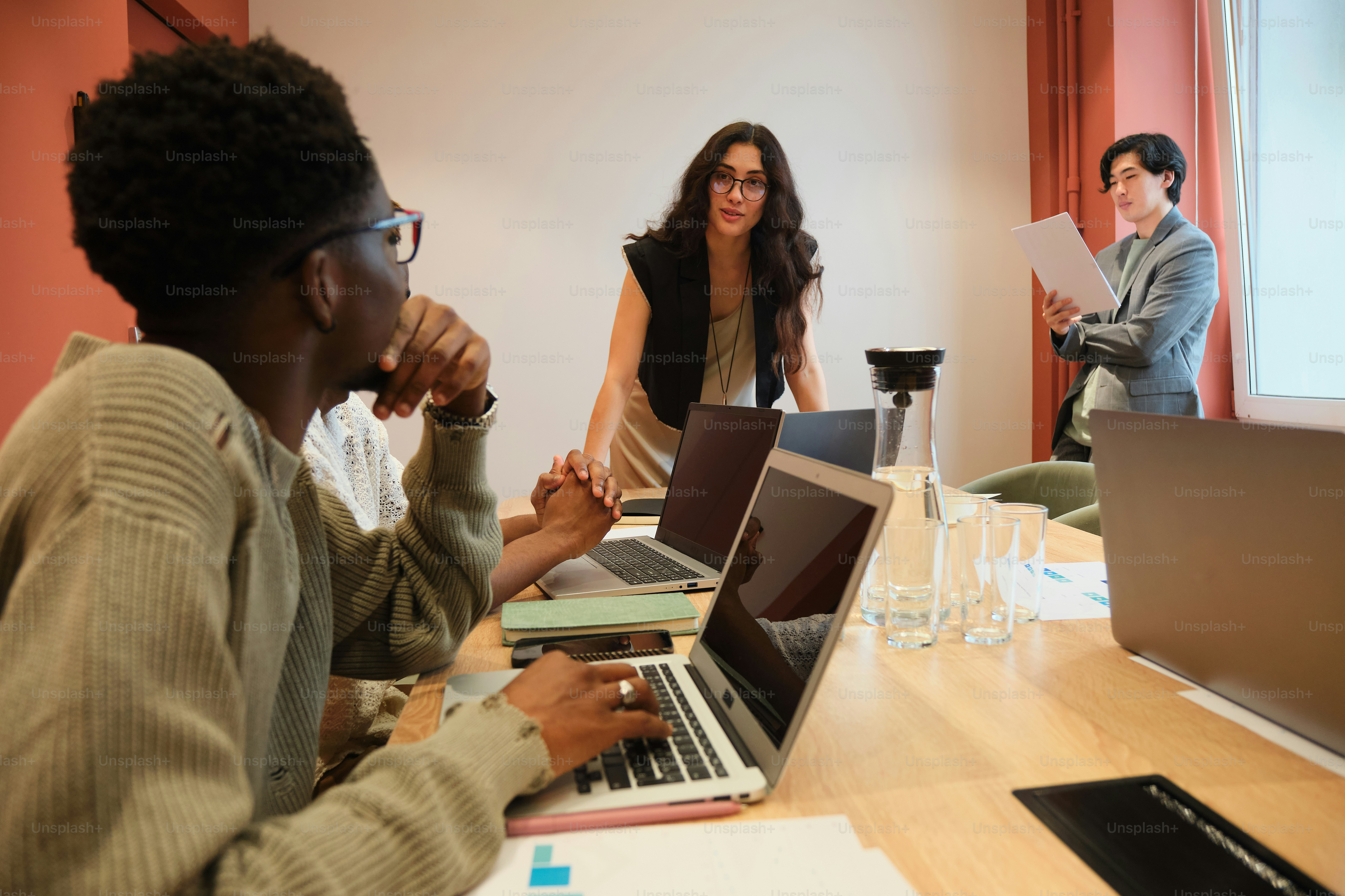 Team members are collaborating in a meeting room. photo – Team Image on ...