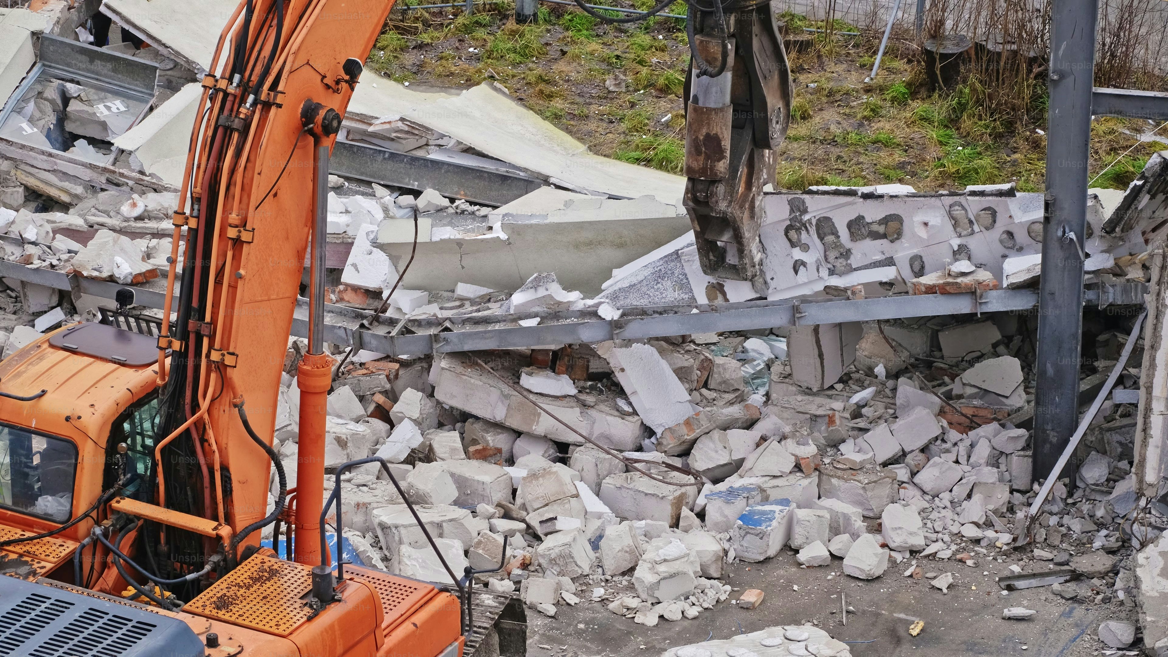 Industrial Crane Tearing Down Buidling Wall Dismantling Structure at ...