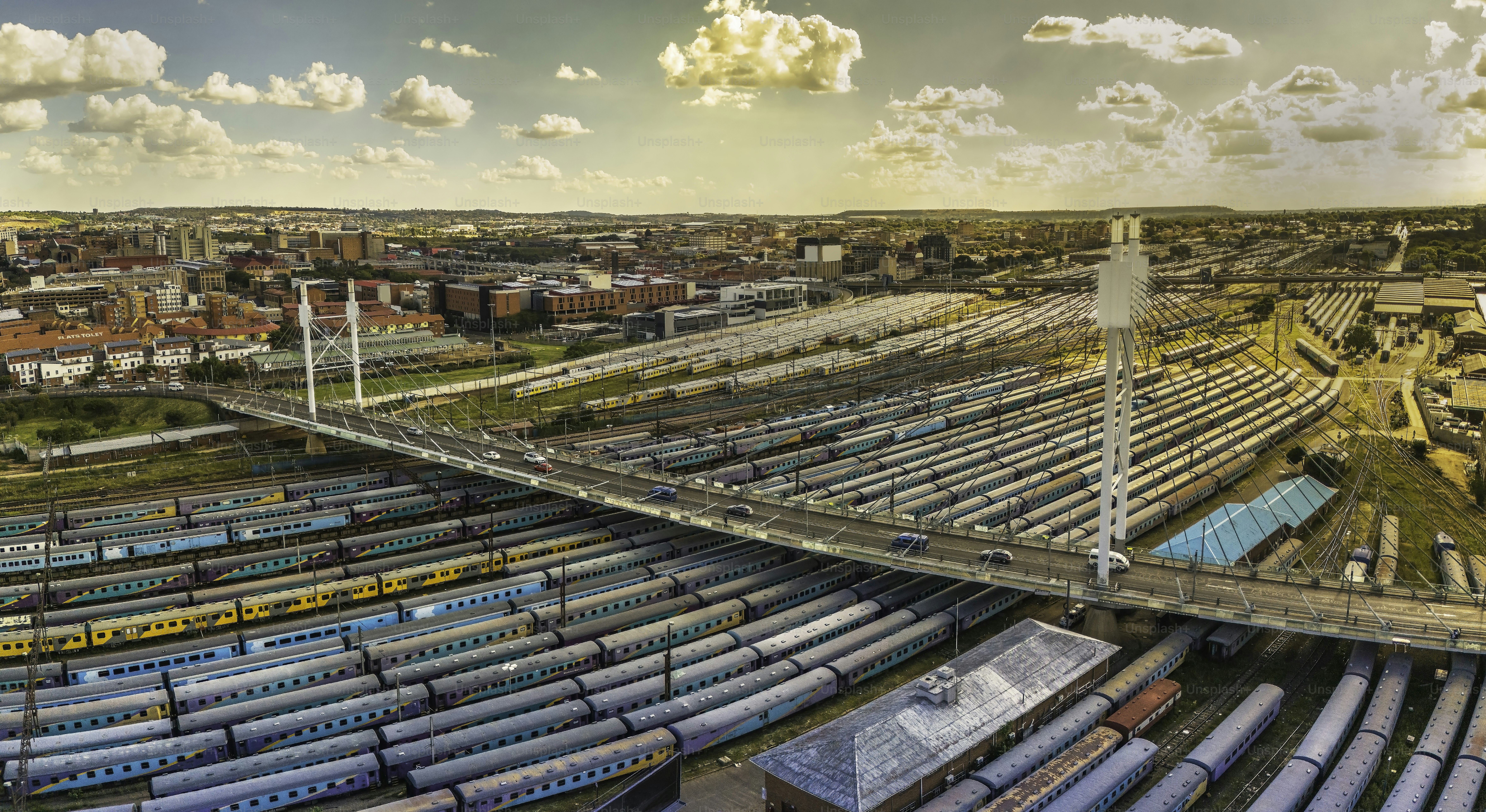 Nelson Mandela Bridge with the train coaches stationery that lead up to ...