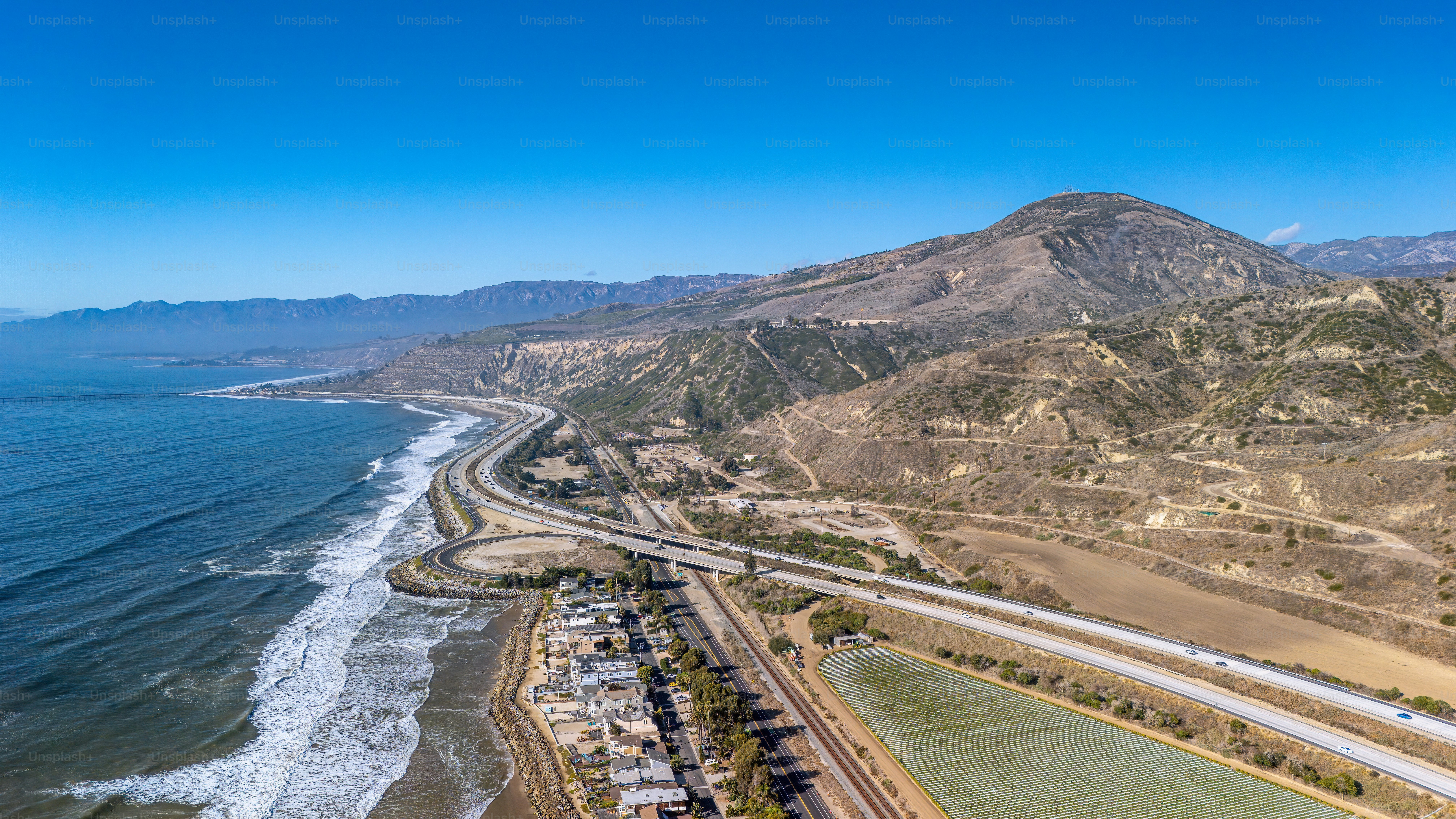 Aerial view of Highway 1, Rincon Beach Park and Santa Barbara Channel ...