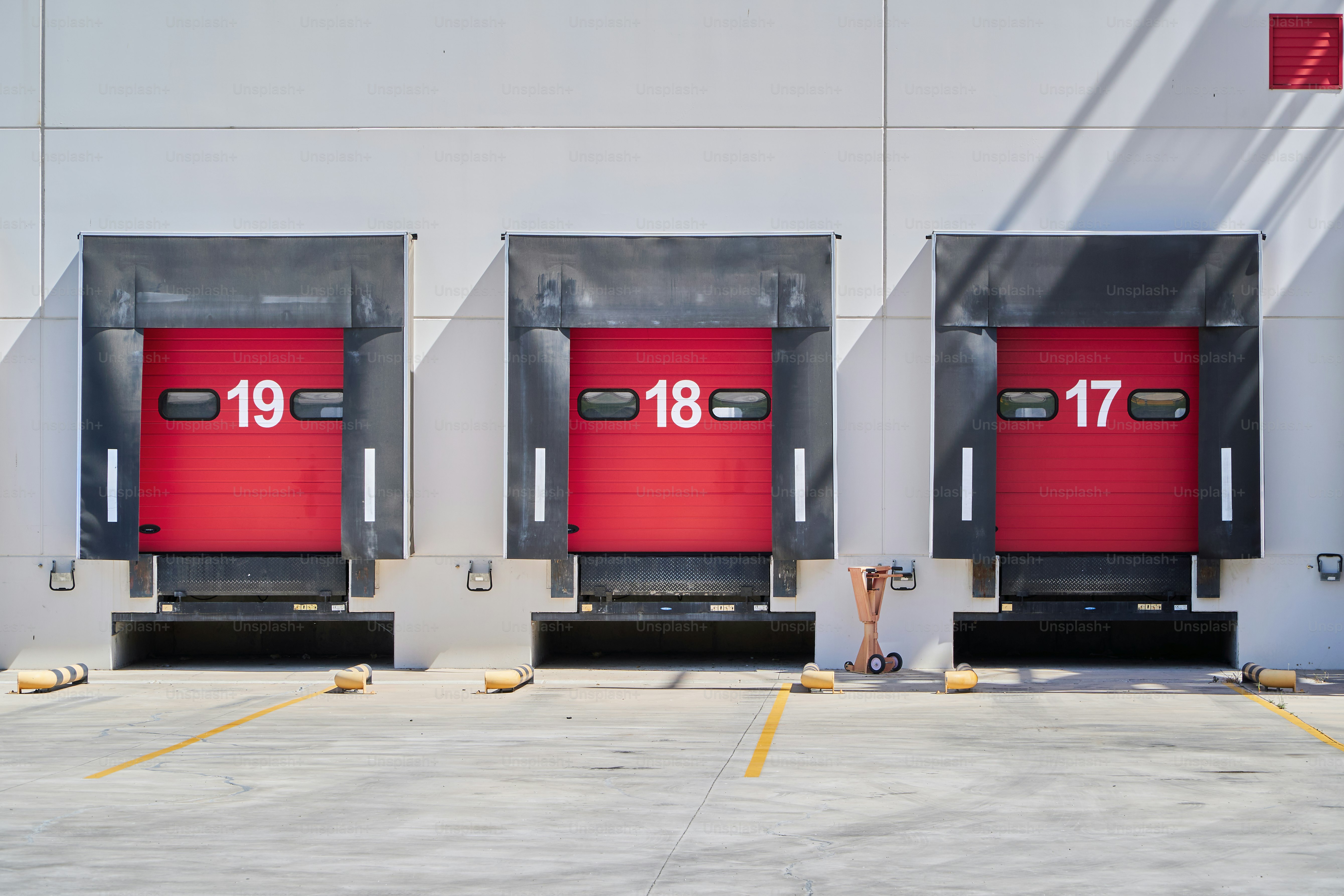 Truck loading dock on an airport, factory or fire station photo ...