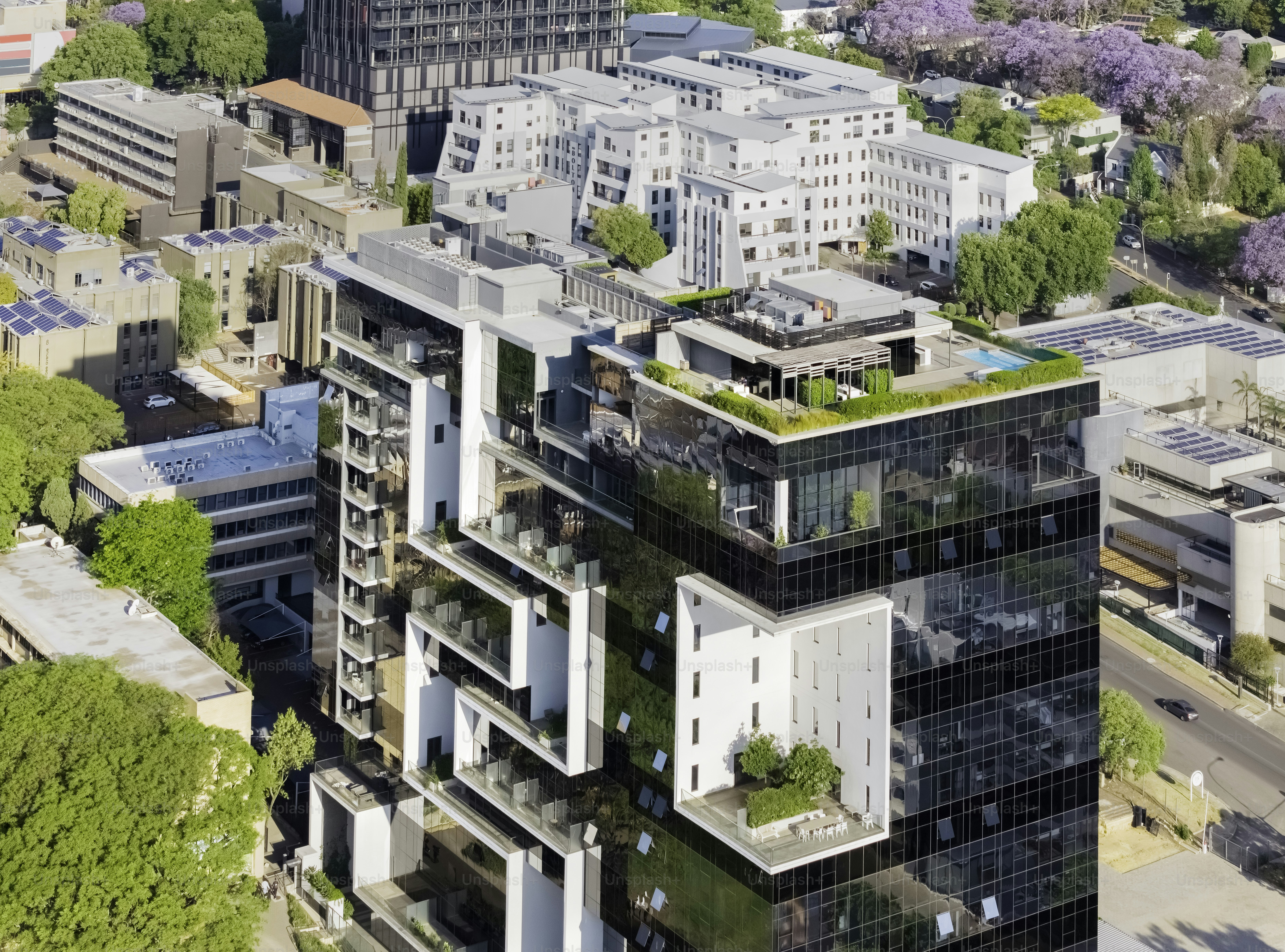 Building showing garden with swimming pool, bringing nature to the ...