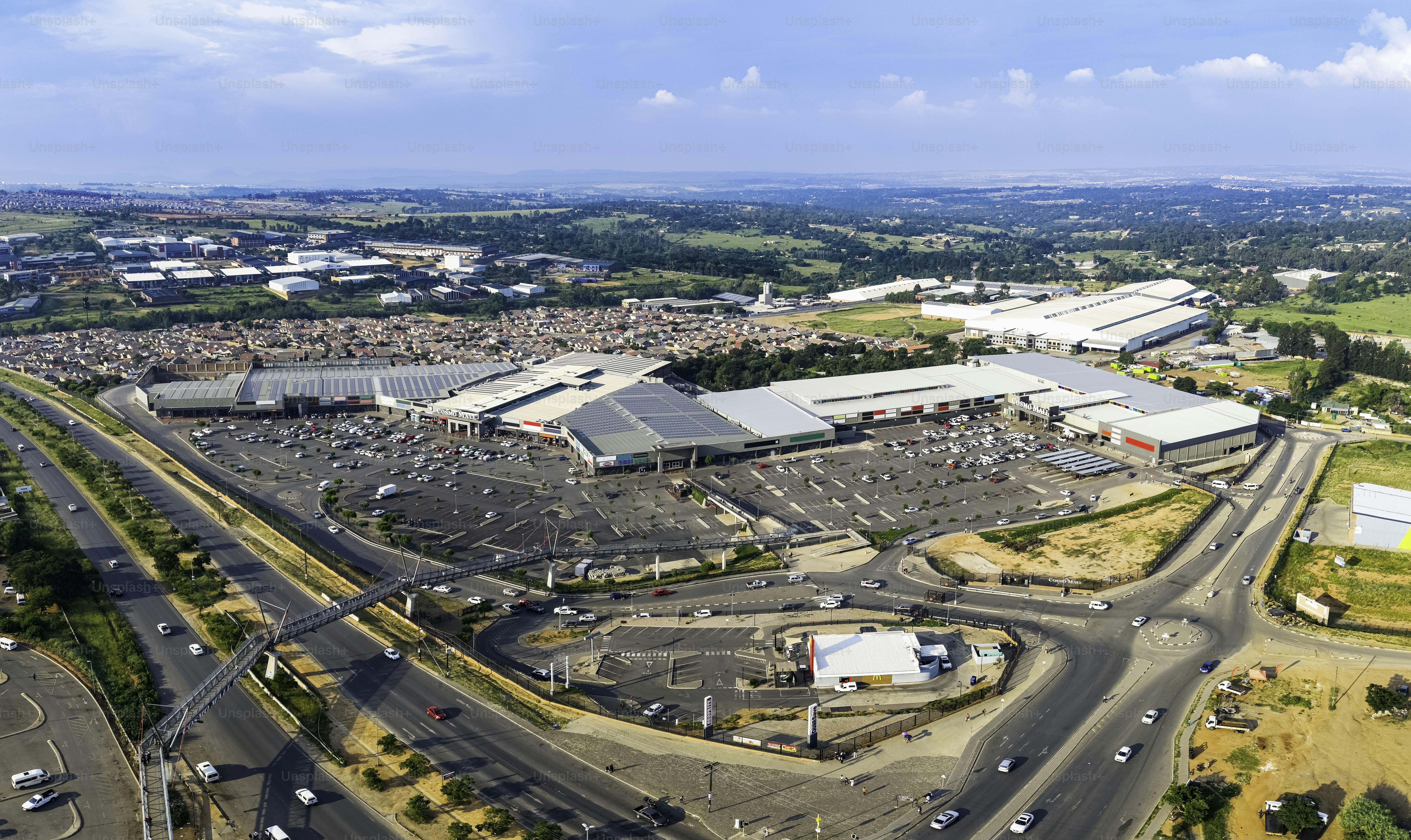 Cosmo City and Cosmo Mall with the pedestrian bridge going over the ...