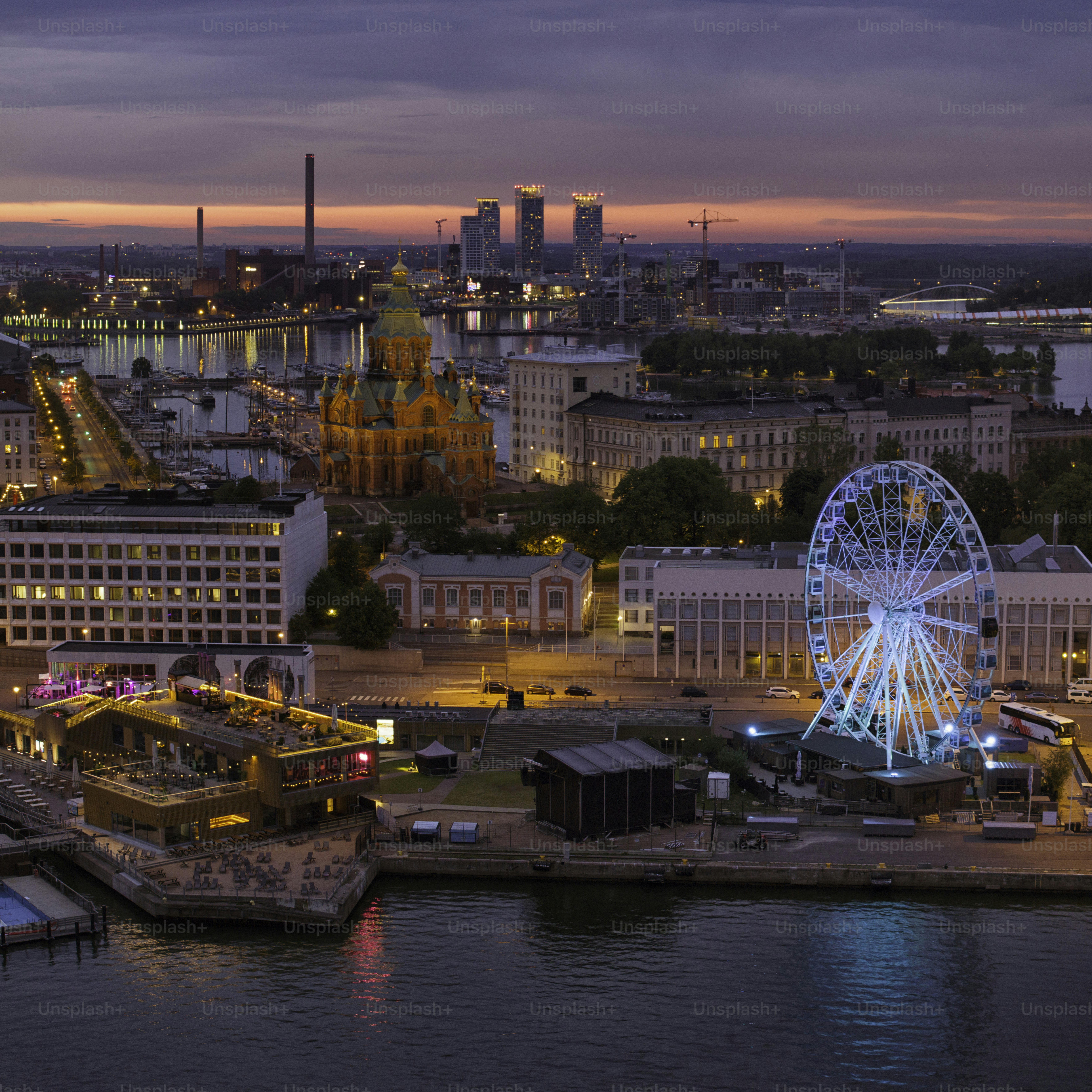Aerial view of downtown Helsinki on a summer night, with a view towards ...
