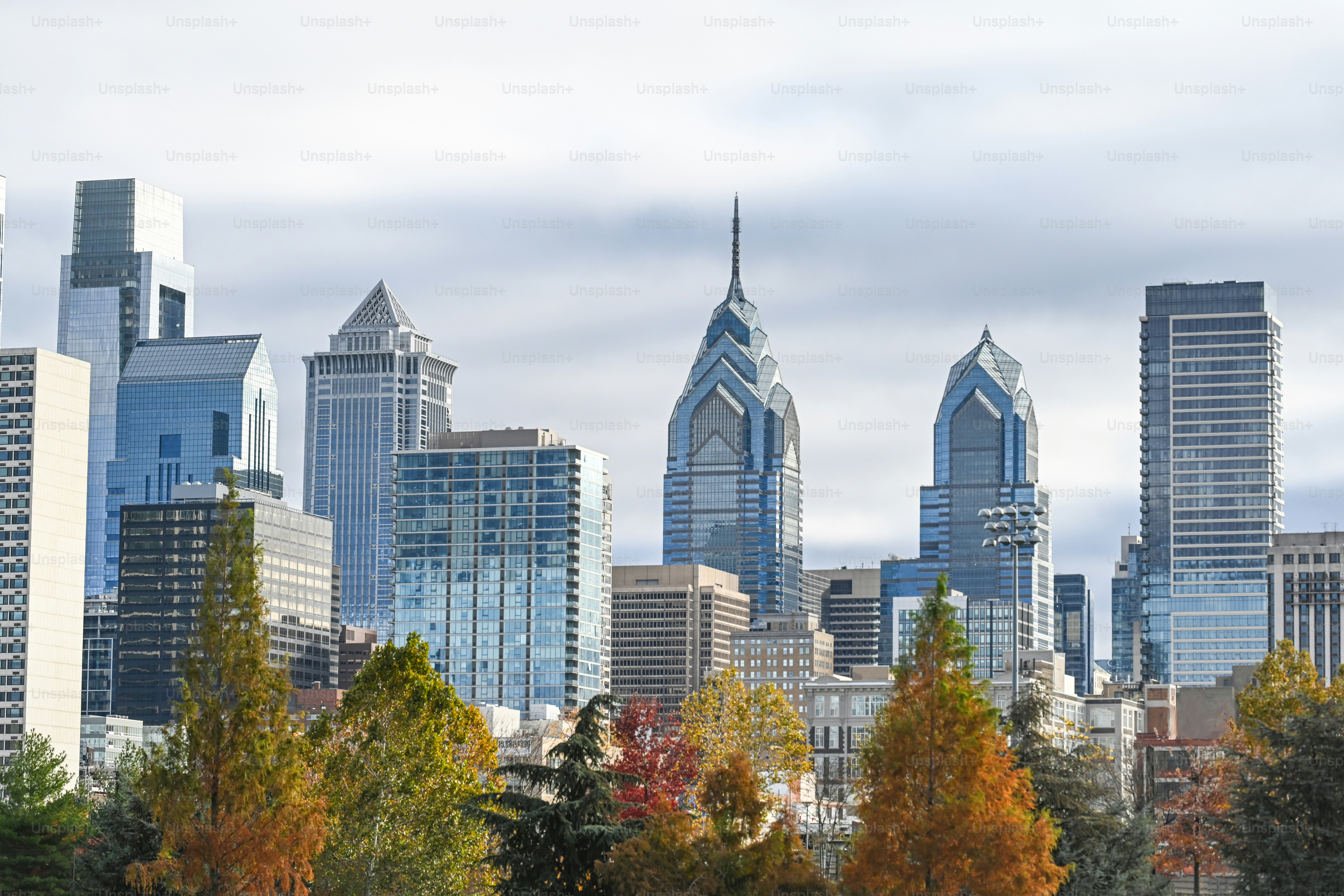 Autumn skyline of Philadelphia. Colourful trees in the foreground photo ...