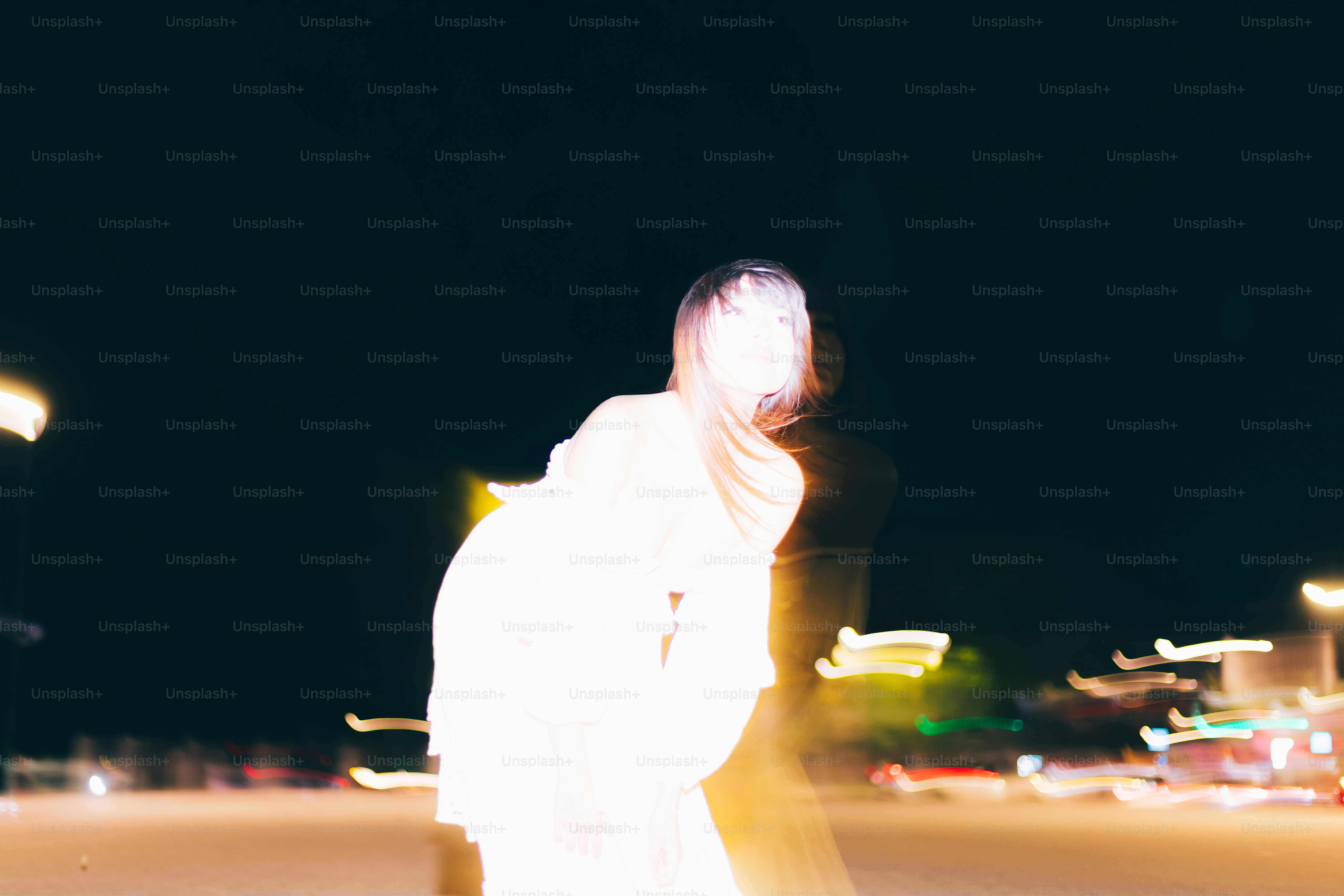 Blurred person glows at night in city lights. photo – Flash Image on ...