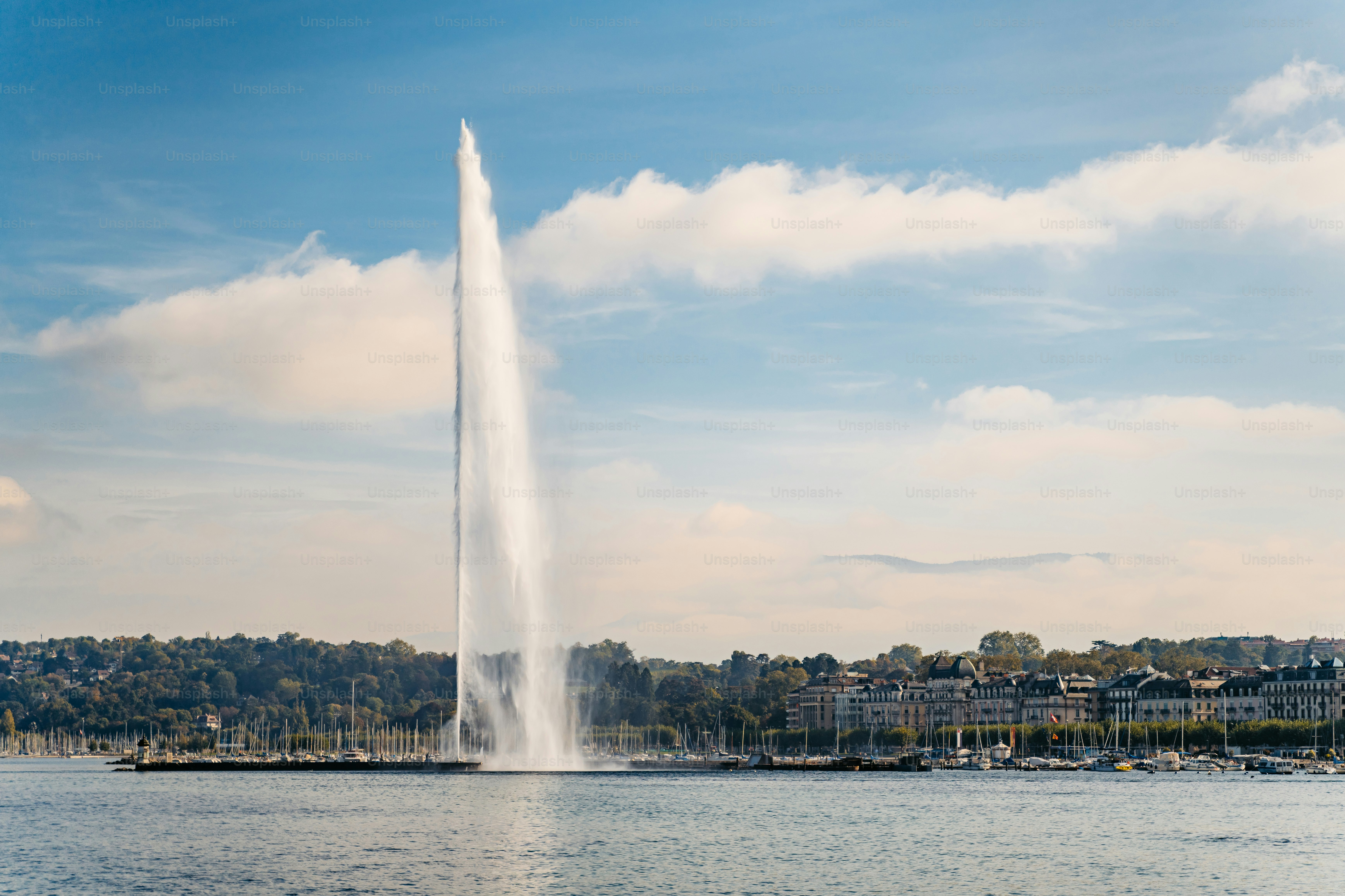 The Geneva Water Fountain (Jet d'Eau) in Switzerland. photo – Travel ...