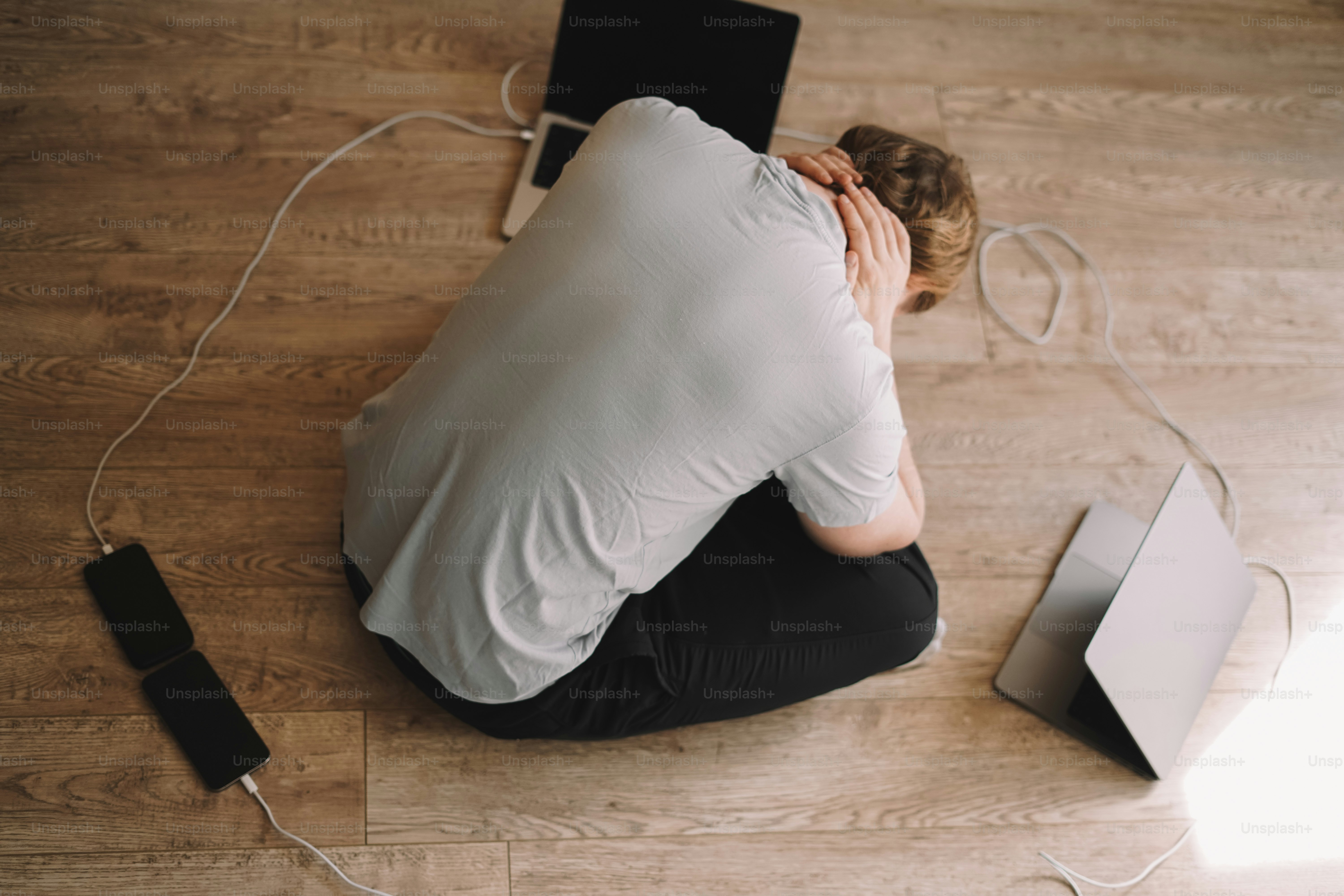 Person exhausted and overwhelmed by technology. photo – Technology ...