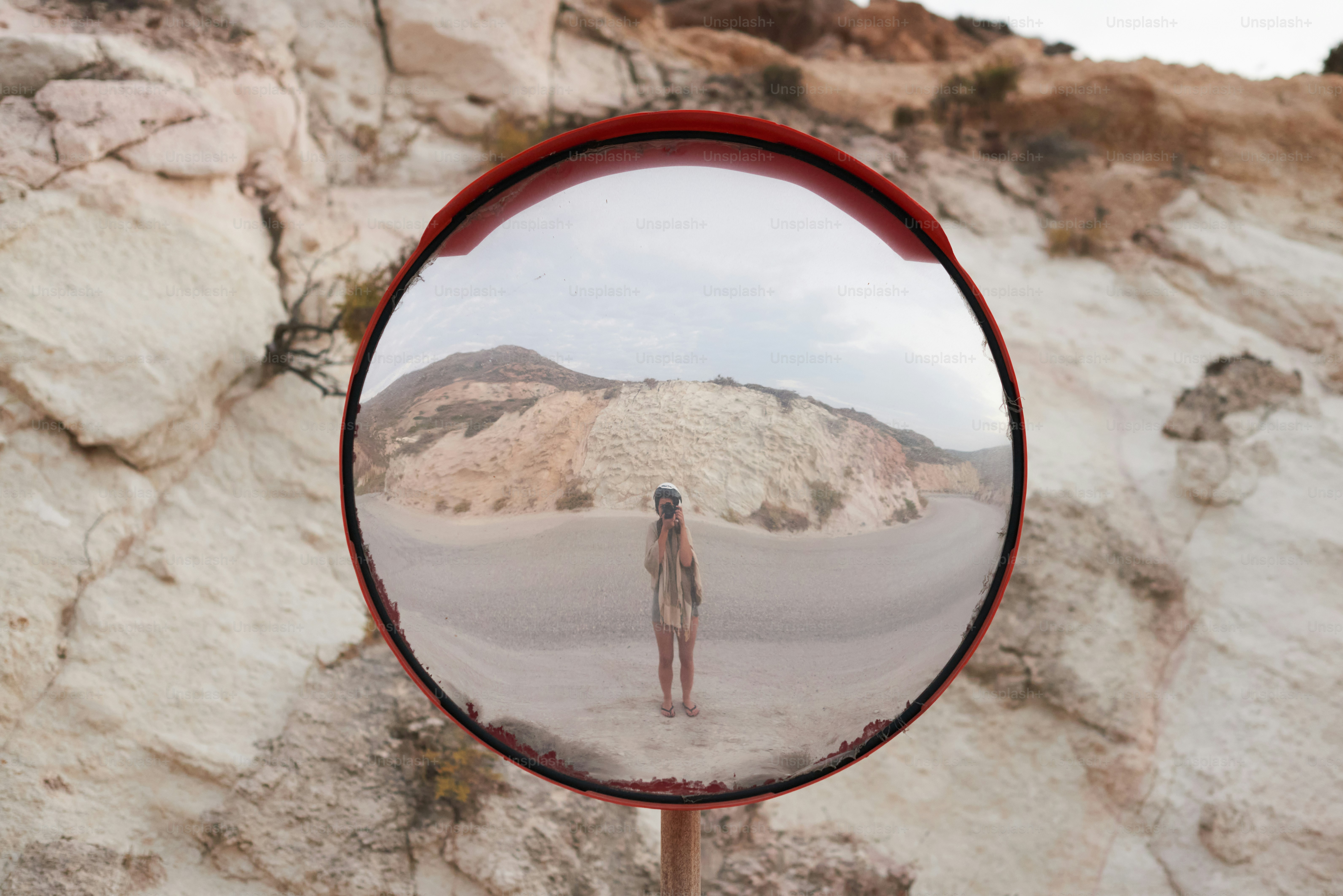 The distorted landscape is reflected in the mirror. photo – Portrait ...