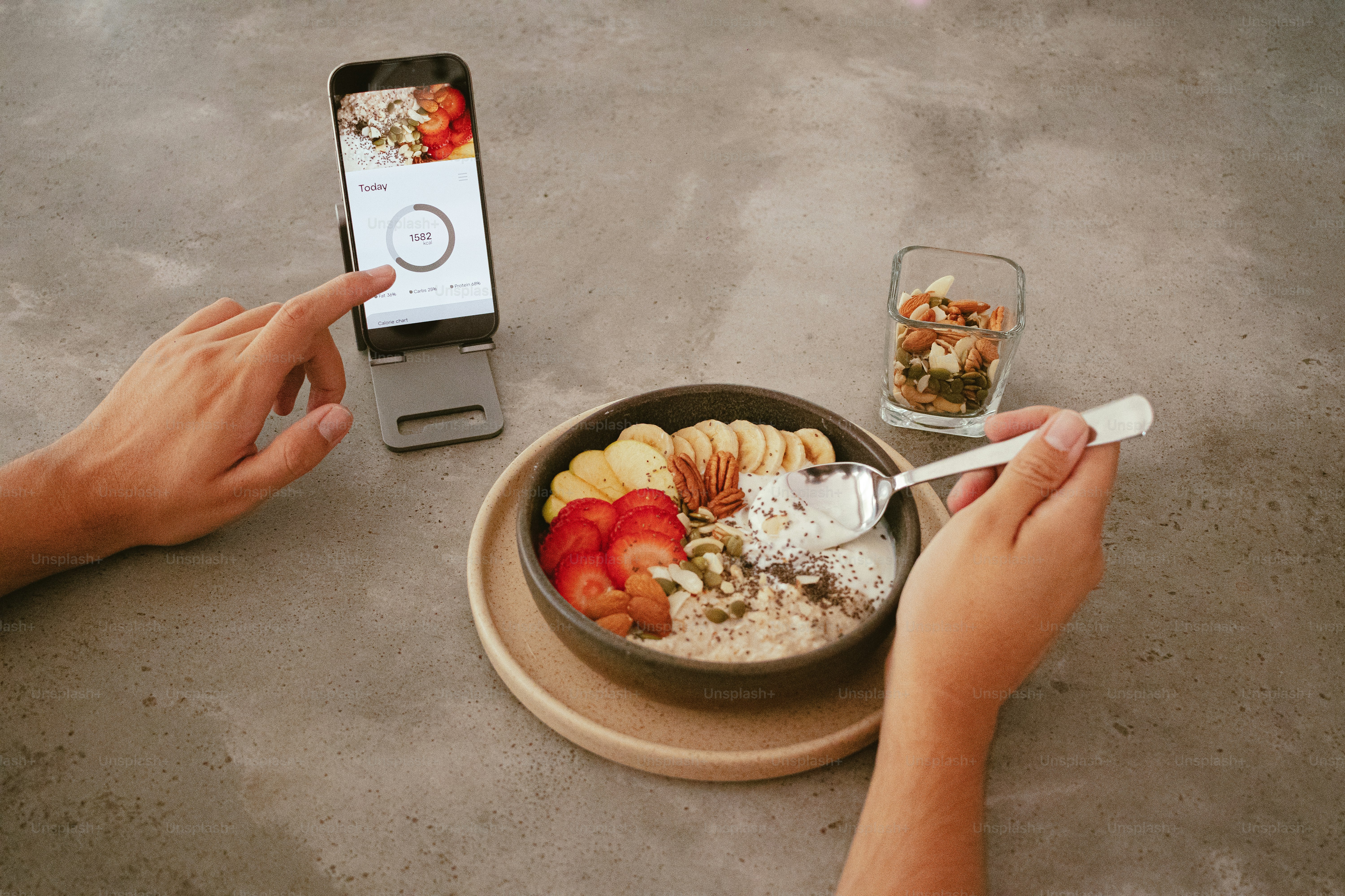 Tracking food intake with a smartphone and healthy breakfast. photo ...