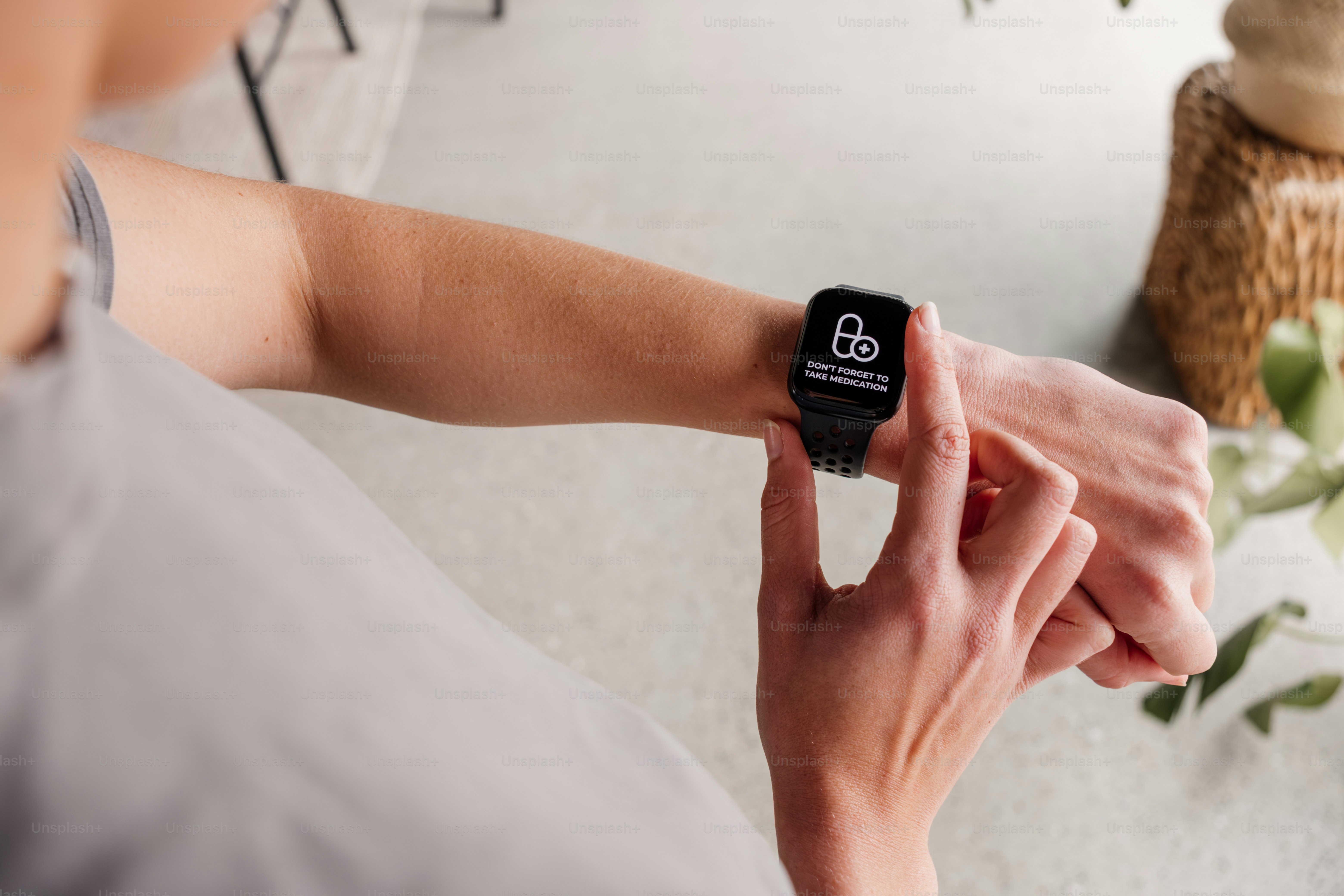 A person uses a smartwatch with a lock screen. photo – Tech Image on ...