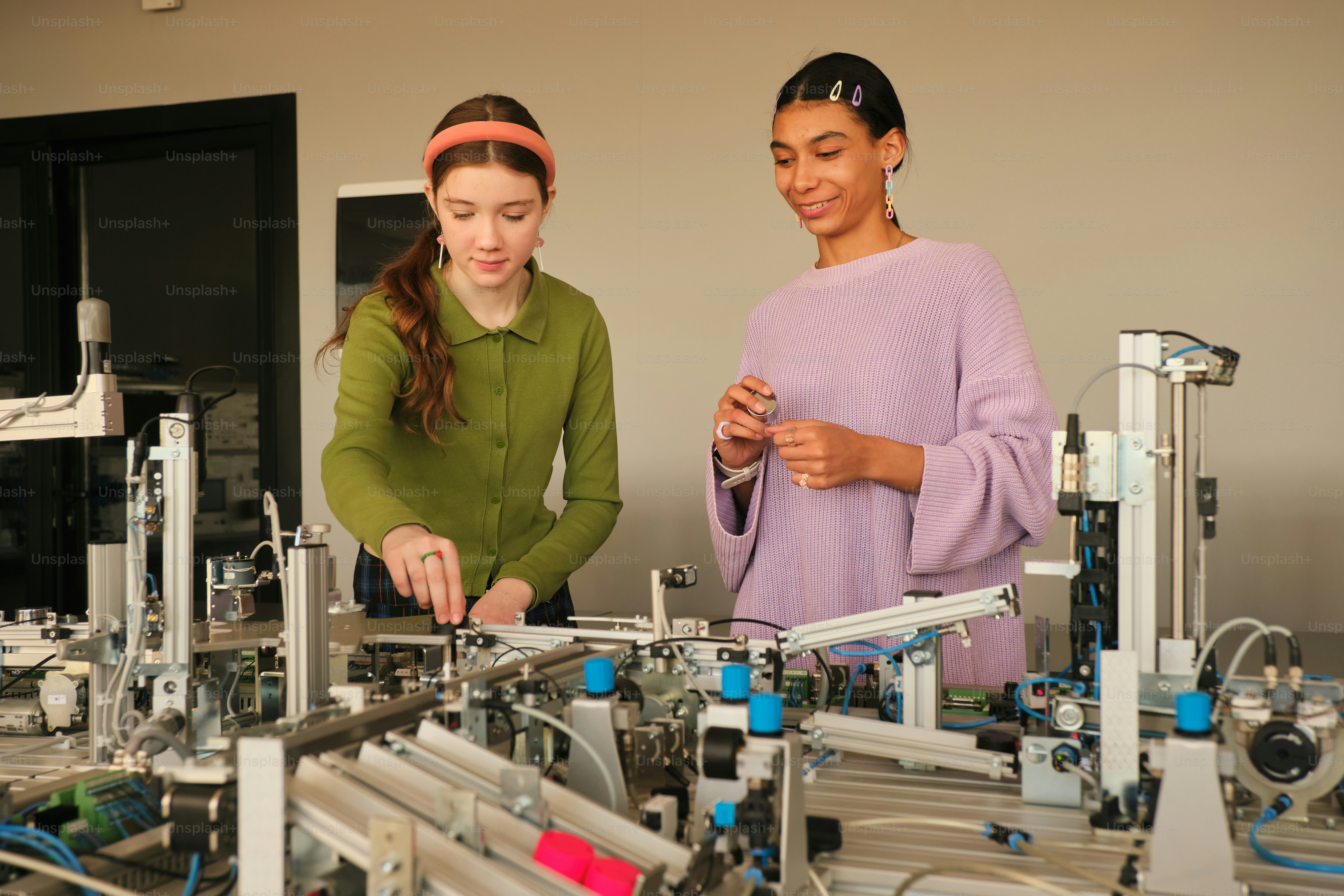 Students work on an engineering project in the classroom. photo ...