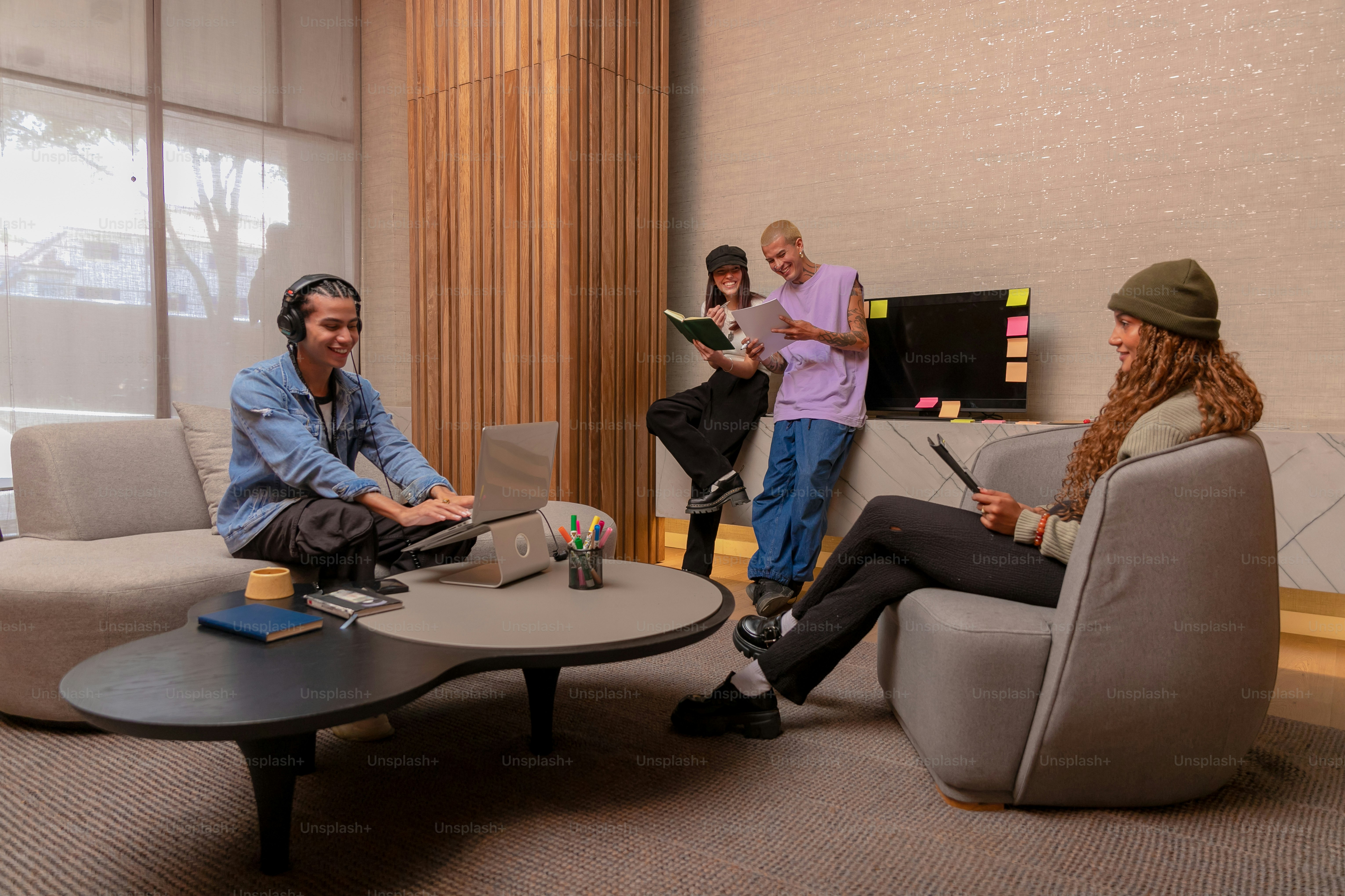 People are working and conversing in a modern office. photo – Working ...