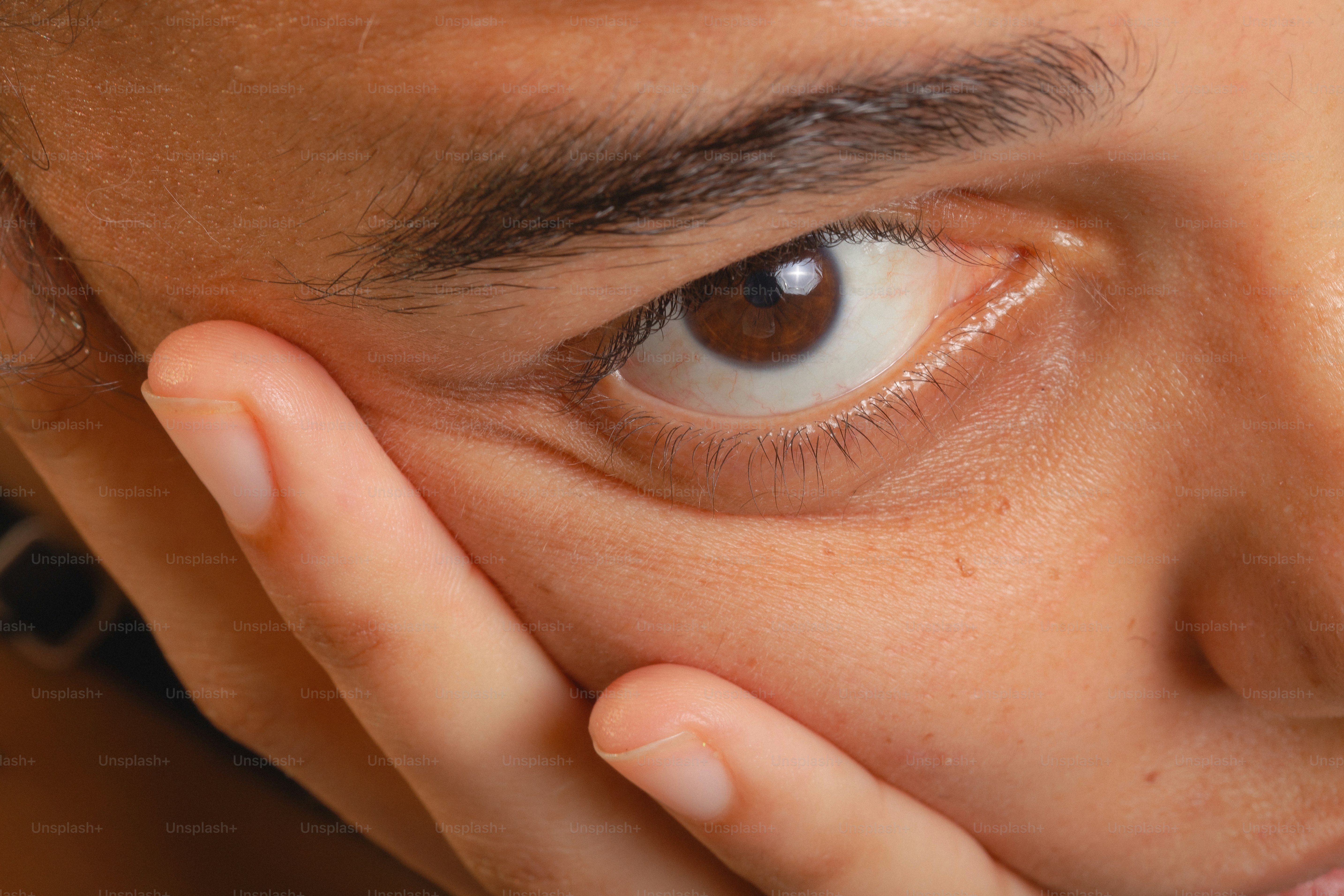Close-up of a person's eye and face. photo – Portrait Image on Unsplash