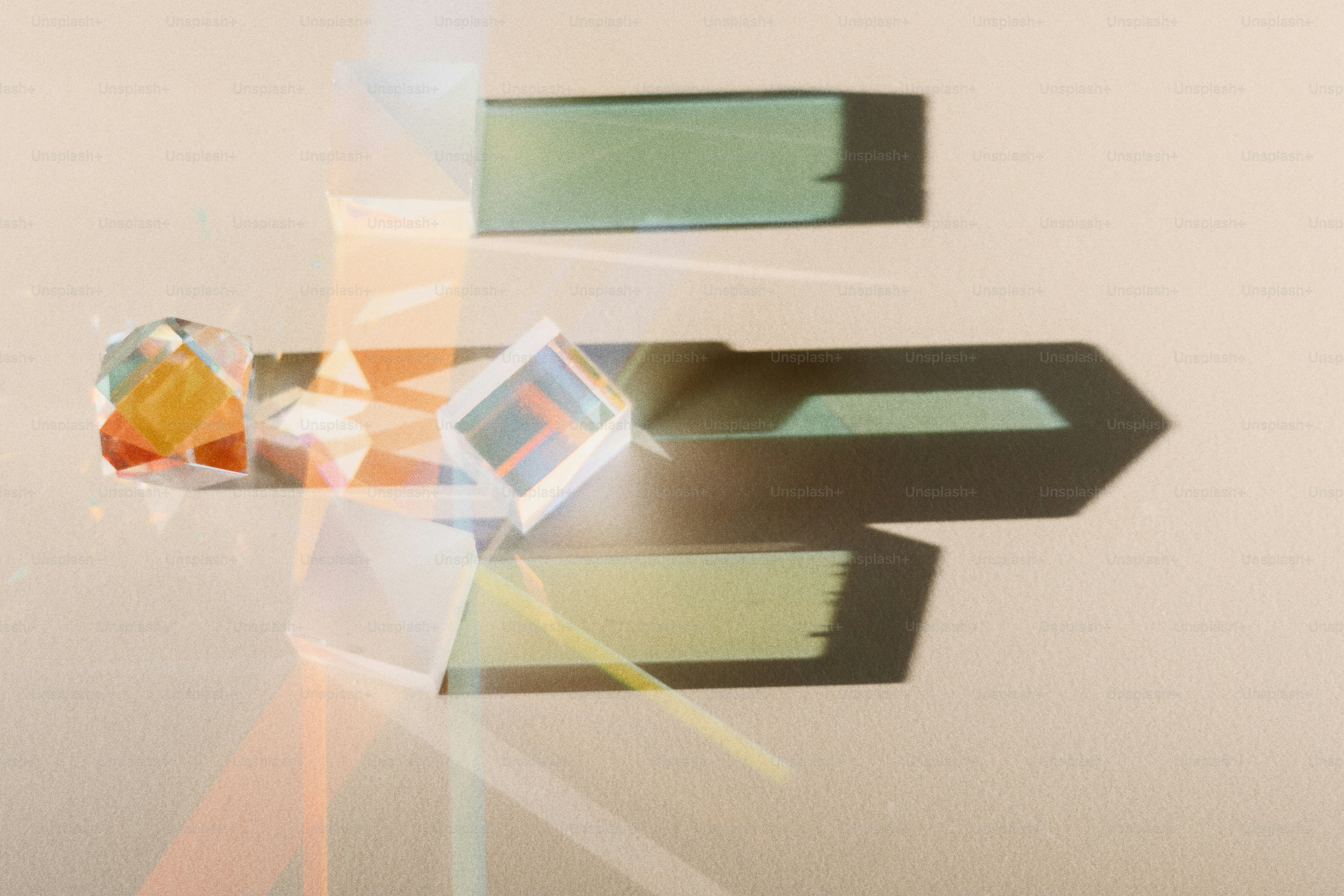 Geometric shapes cast colorful shadows. photo – Minimal Image on Unsplash