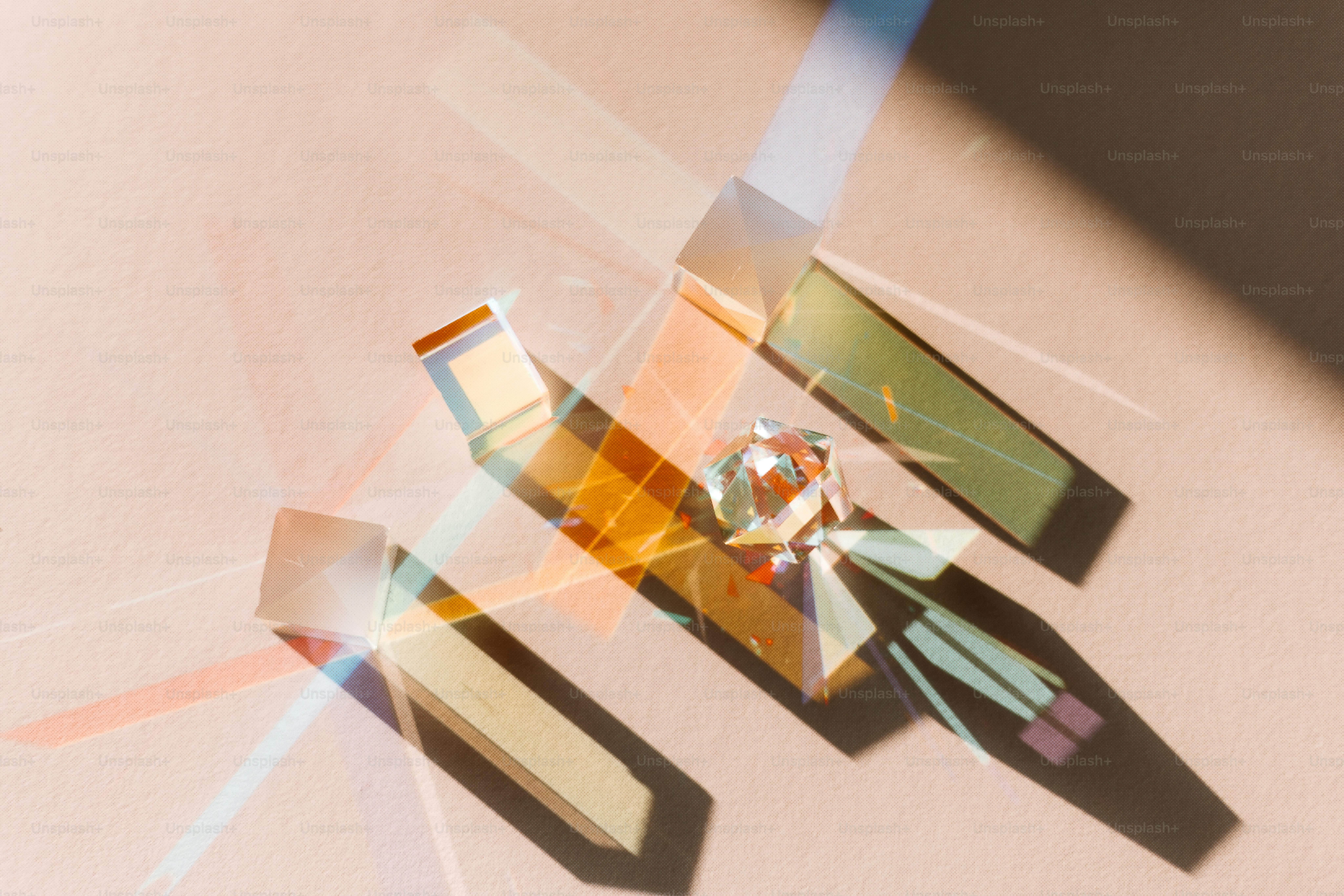Prisms refract light, creating colorful shadows. photo – Minimal Image ...