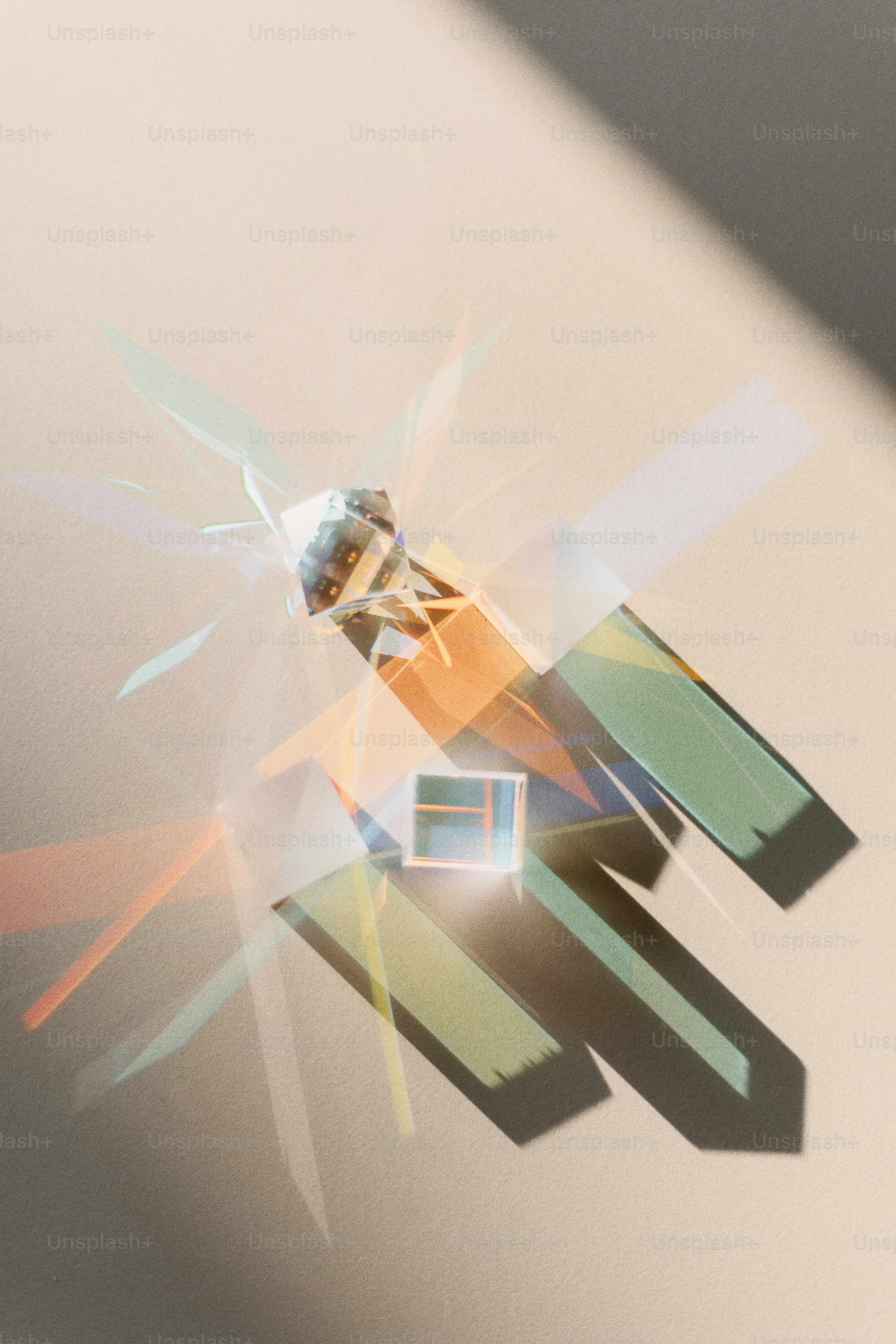 Prism refracts light into colorful shadows. photo – Minimal Image on ...