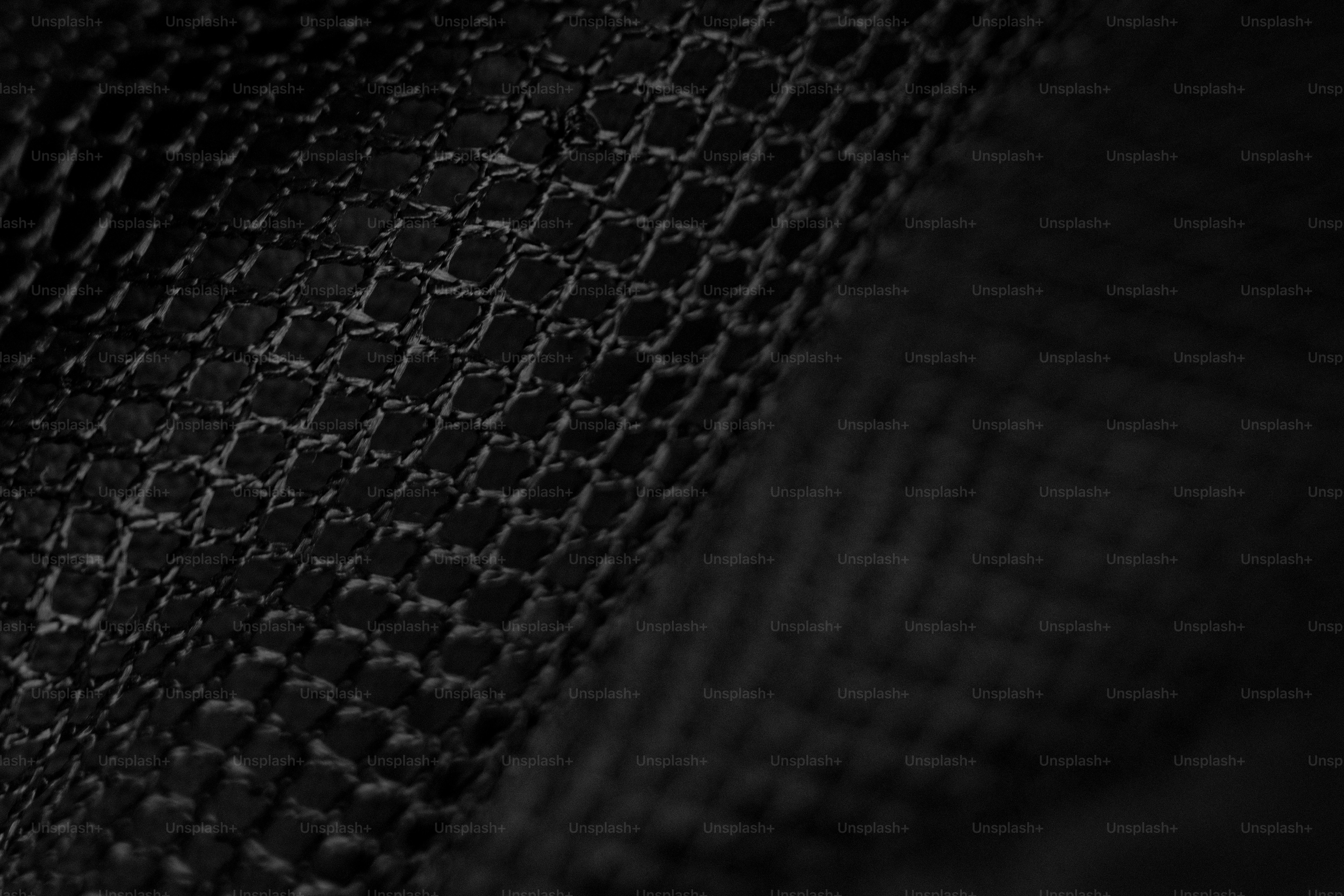 Close-up shot of a textured, black mesh fabric. photo – Wallpaper Image ...
