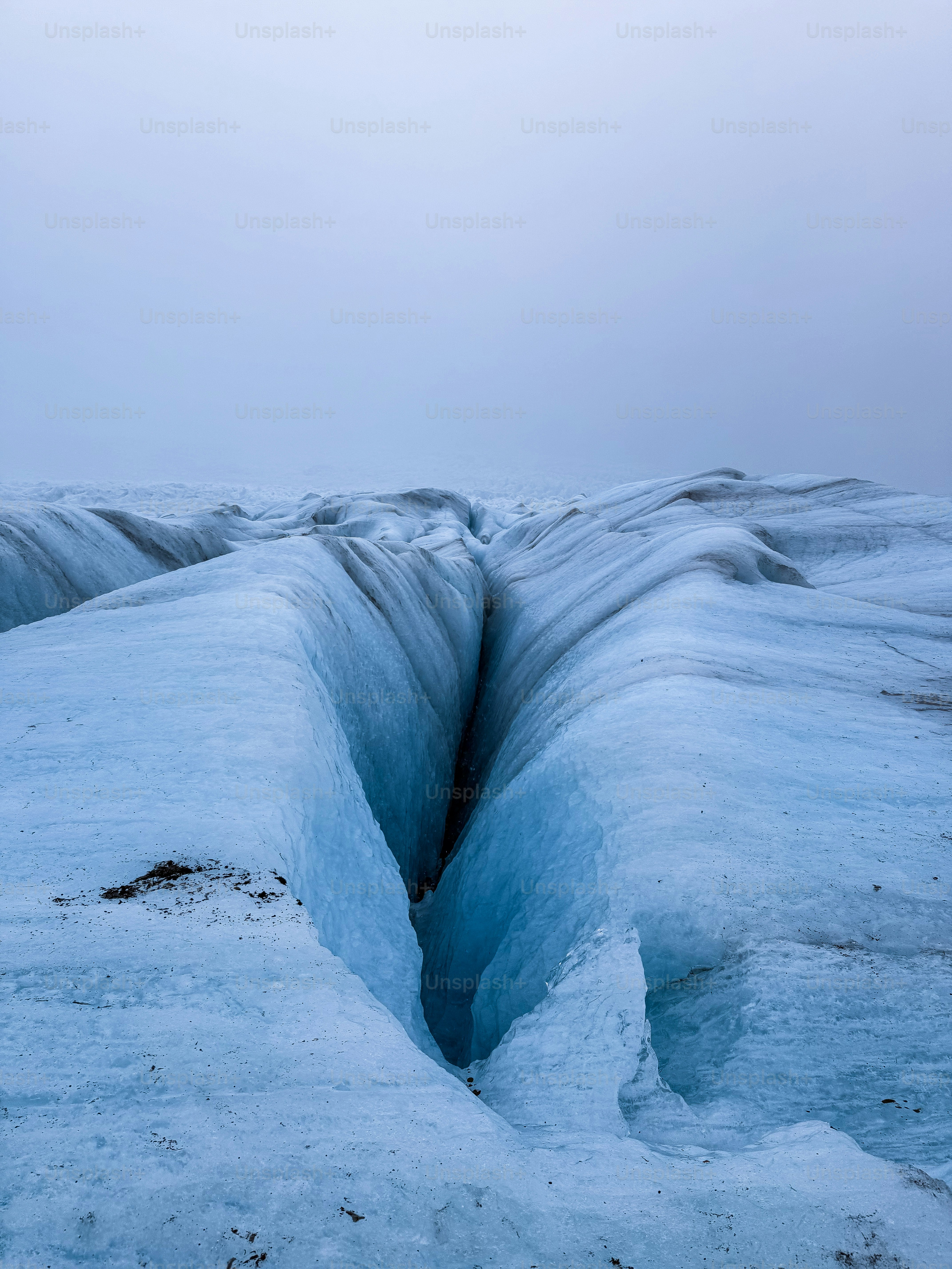 Glacier crevasses show a vast, icy expanse. photo – Wallpaper Image on ...