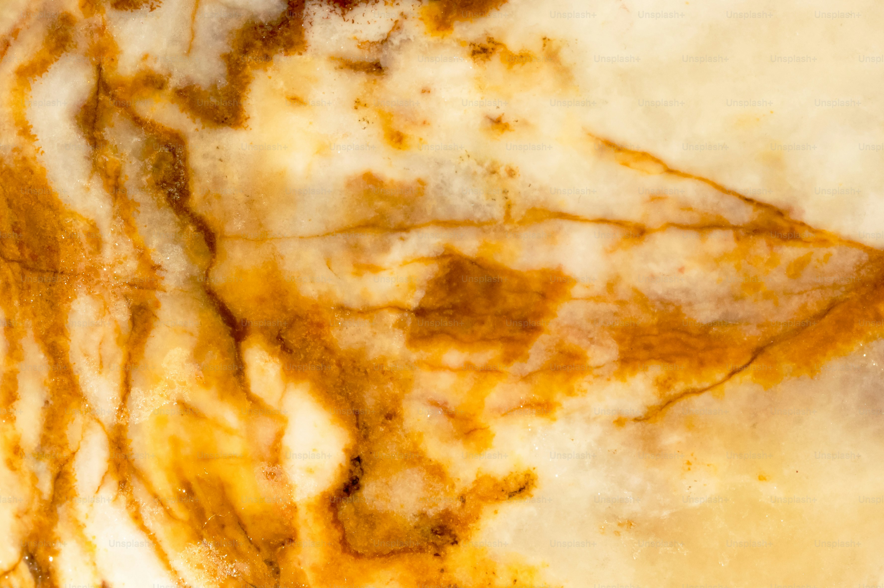 Close-up of a marbled brown and cream stone. photo – Texture Image on ...