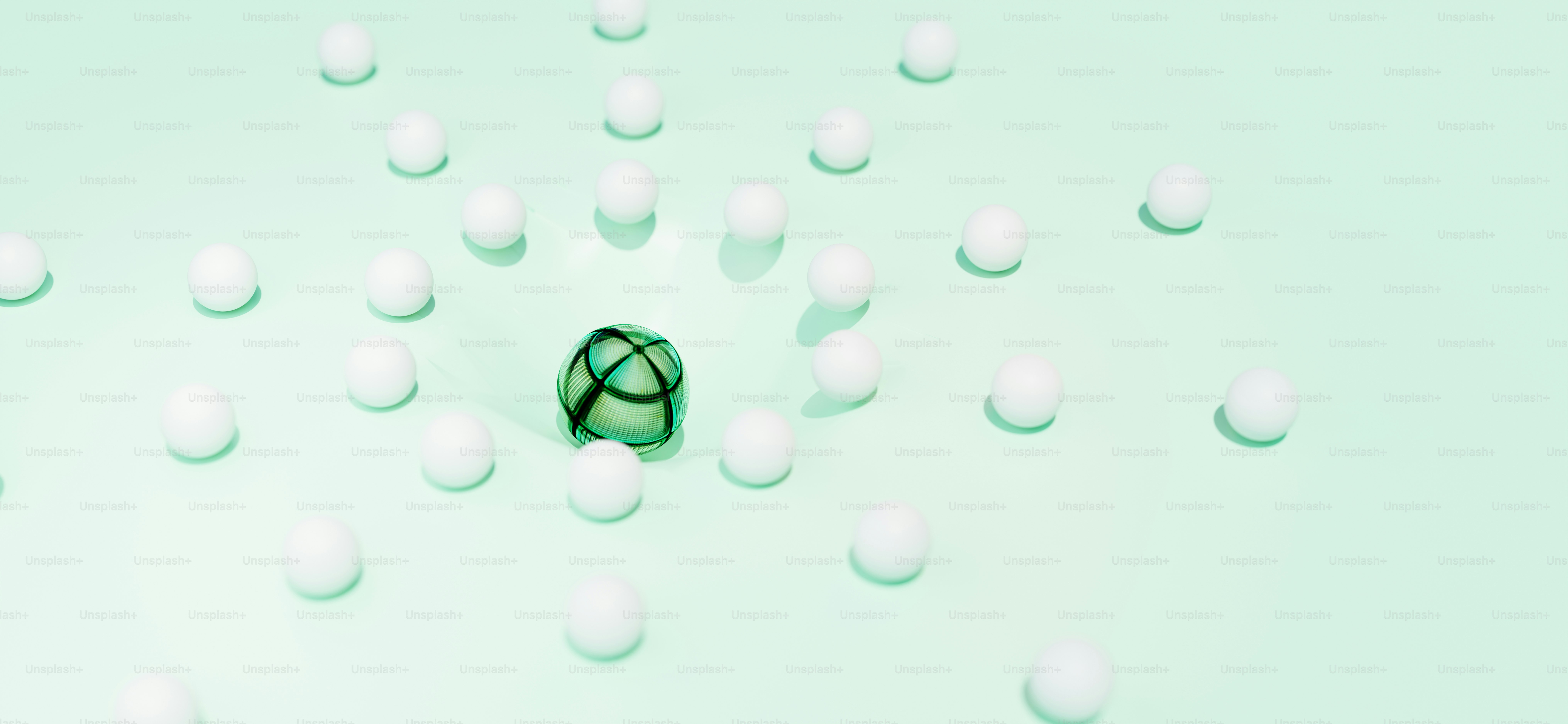 A green orb surrounded by white orbs. photo – 3d render Image on Unsplash