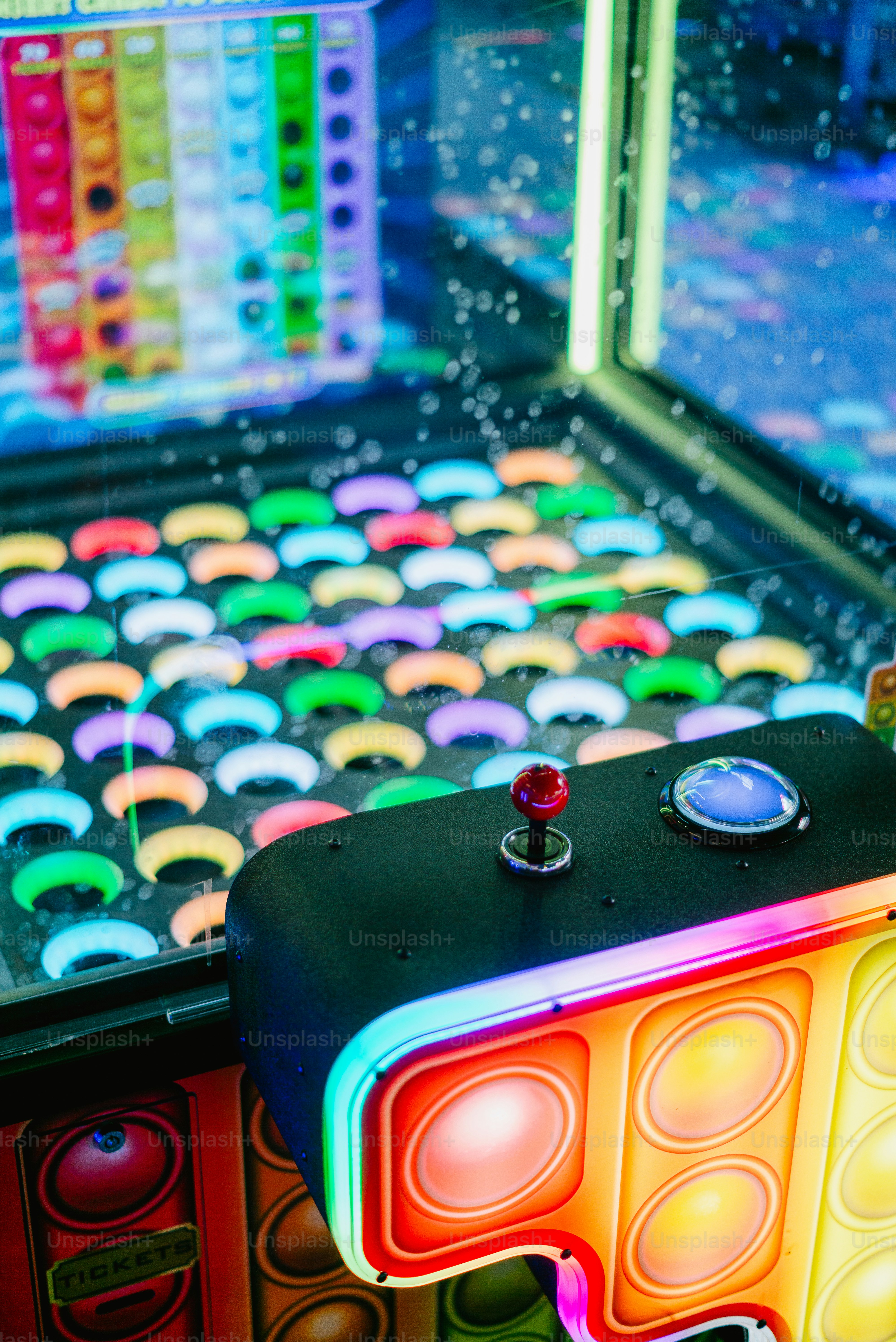 A colorful arcade game awaits a player's touch. photo – Vintage Image ...
