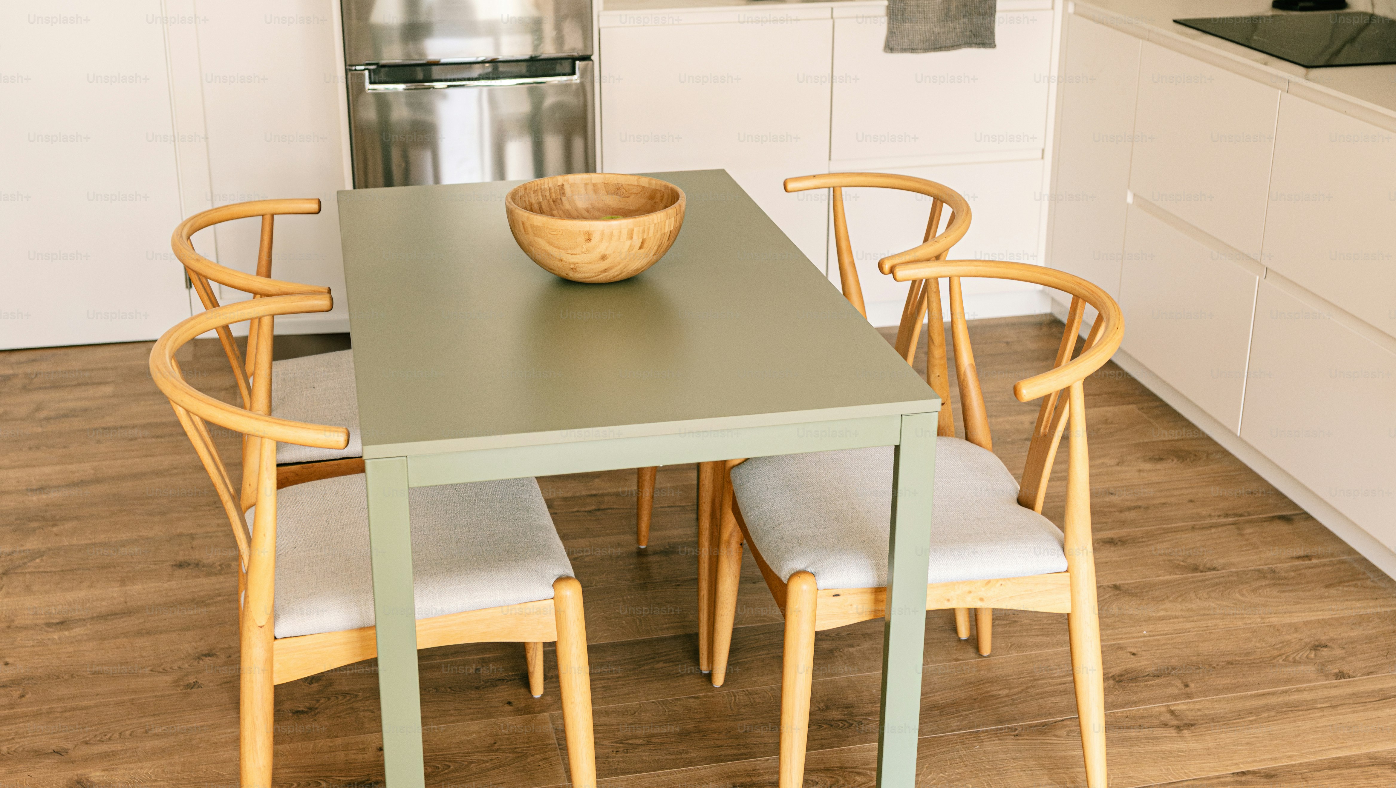 A dining table and chairs in a modern kitchen. photo – Interior design ...