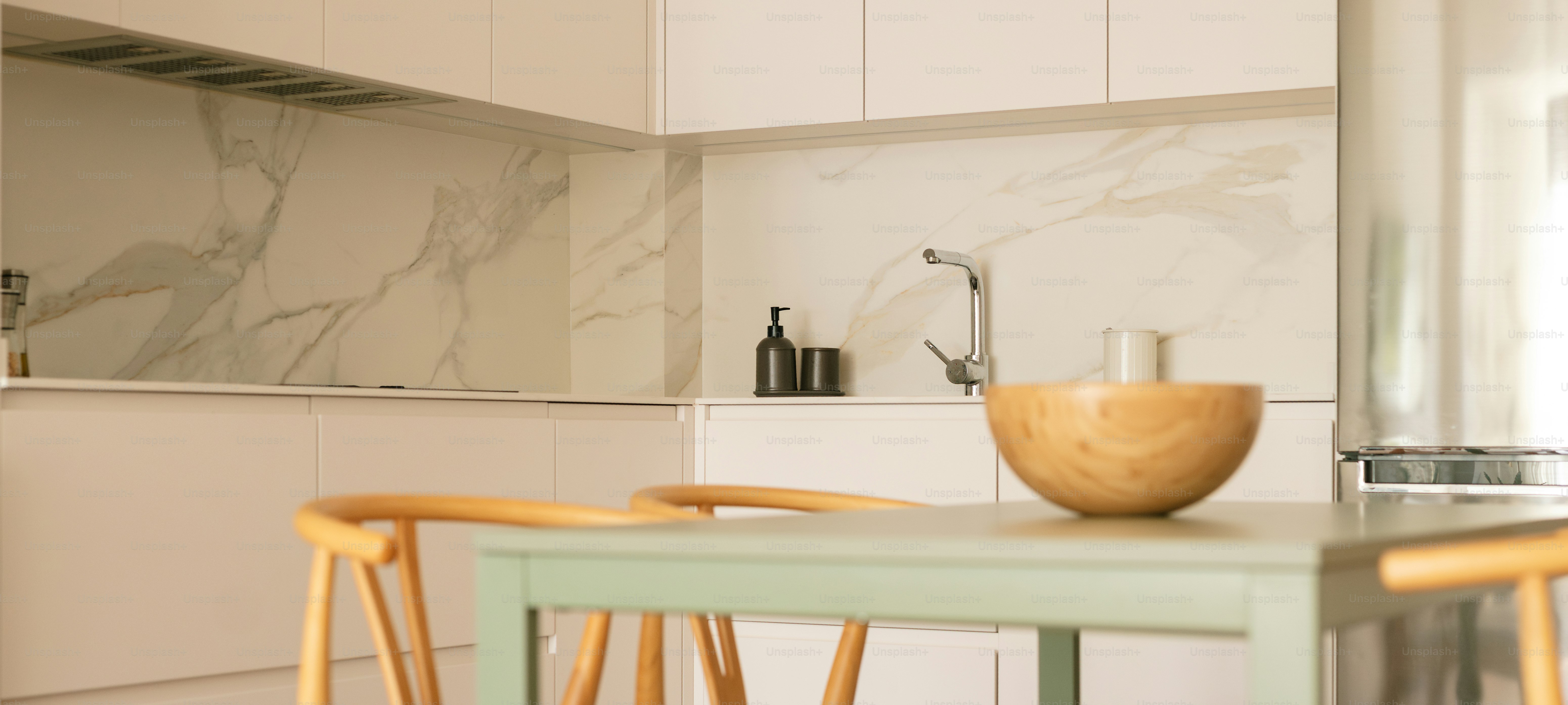 A kitchen table and chairs with an oven. photo – Interior design Image ...