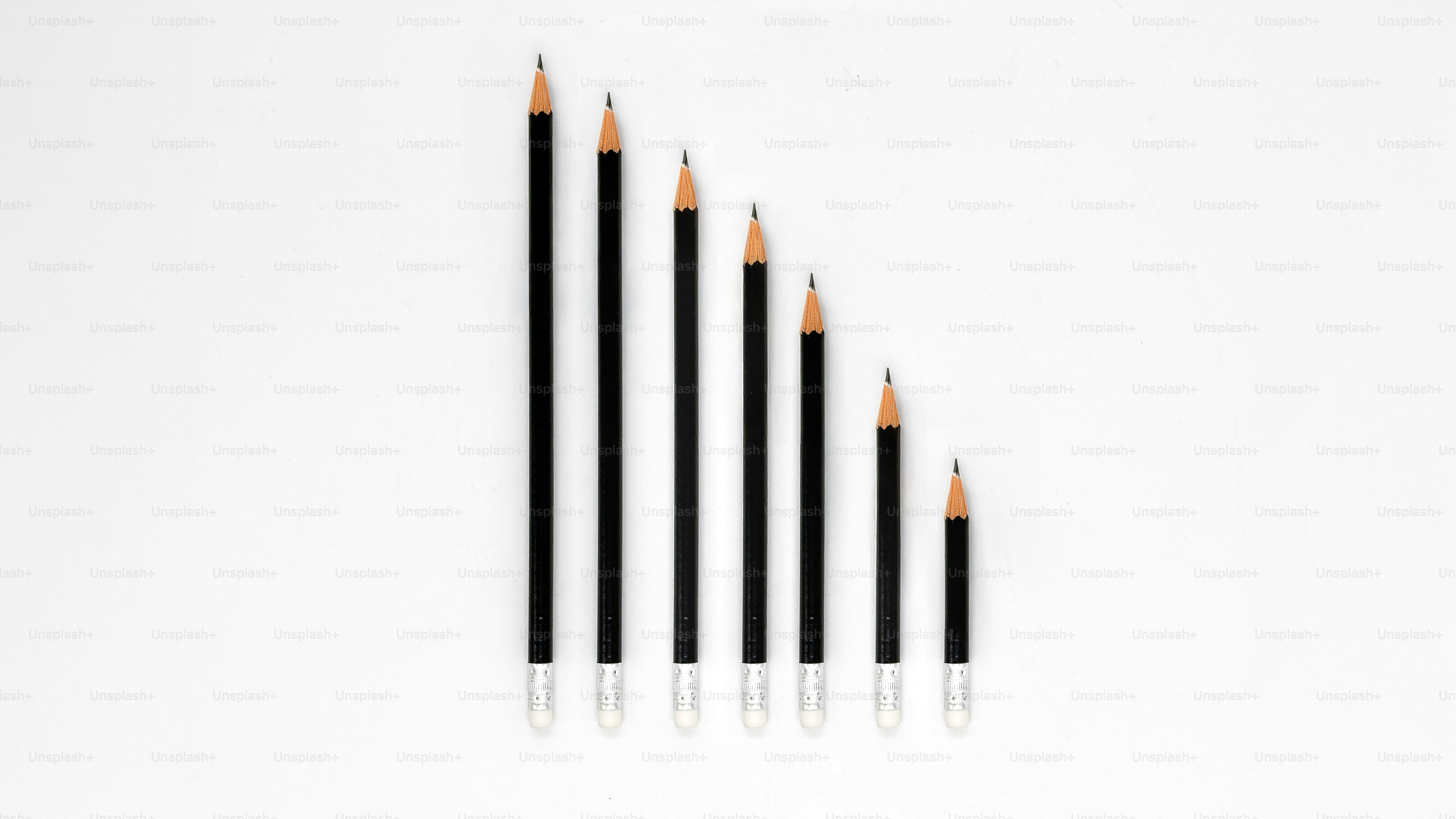Pencils arranged by size, from longest to shortest. photo – Pencil ...