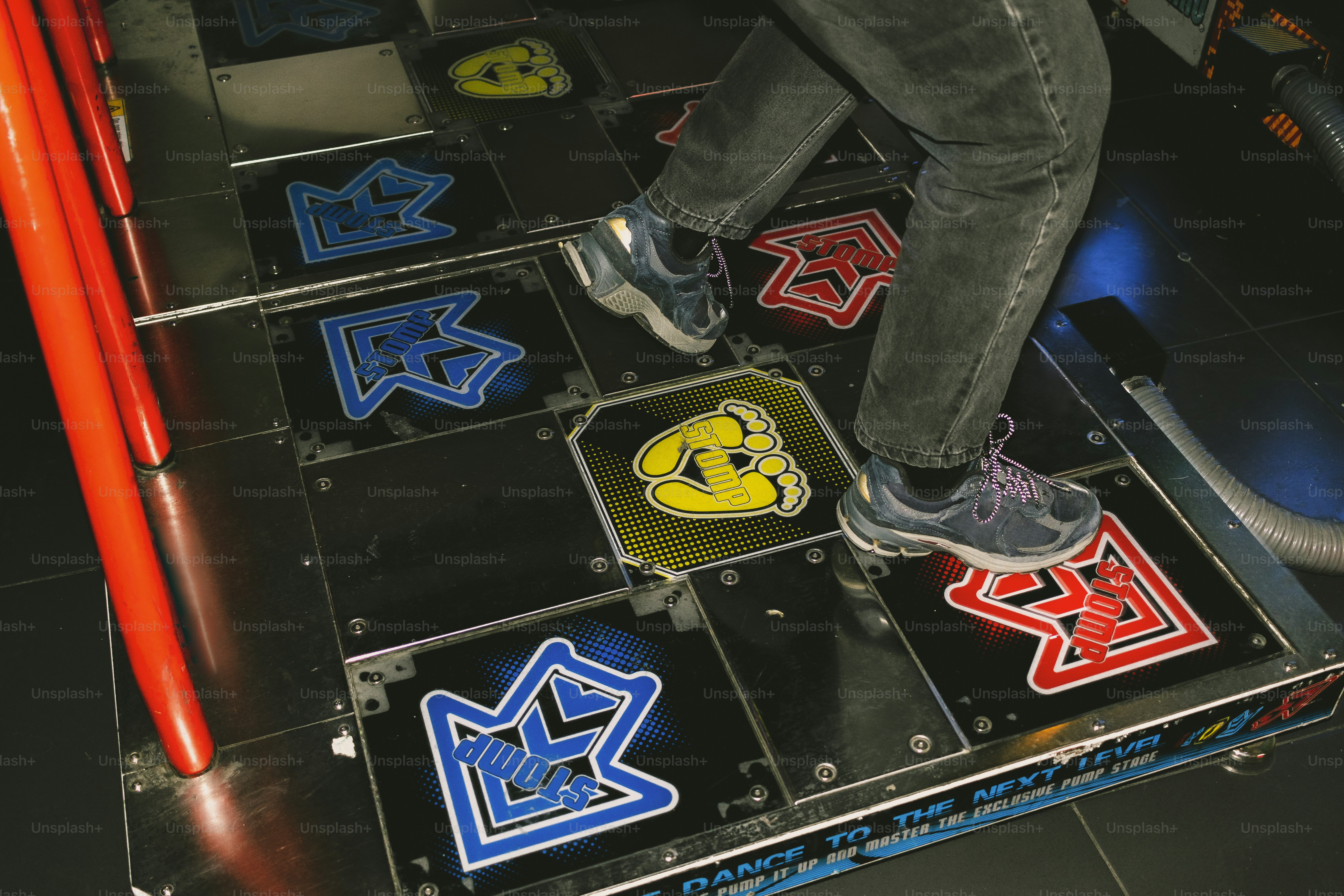 Someone is playing a dance arcade game. photo – Gaming Image on Unsplash