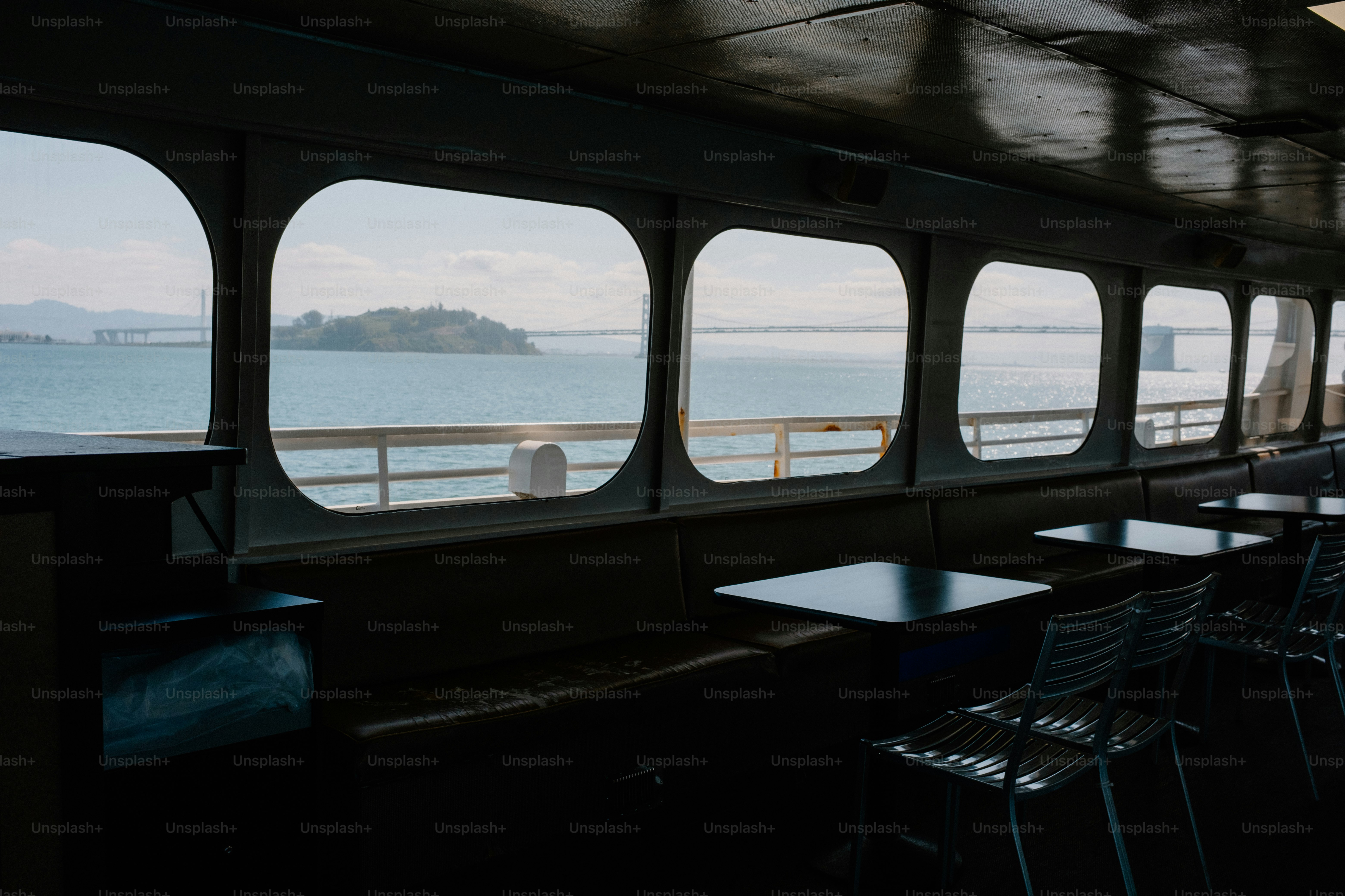 Inside a boat, looking out at a scenic view. photo – Travel Image on ...