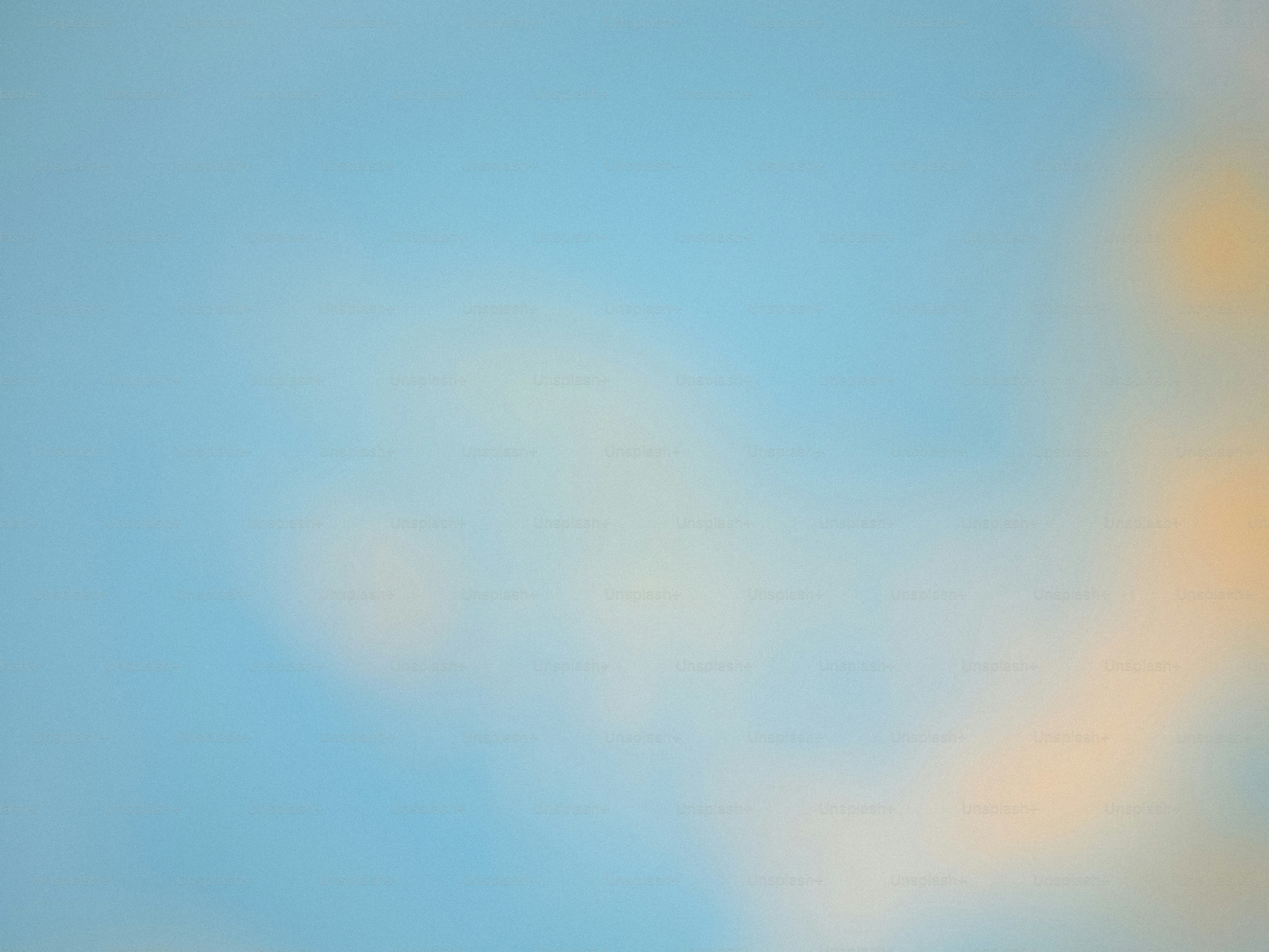 A blurry blue sky with some clouds. photo – Wallpaper Image on Unsplash