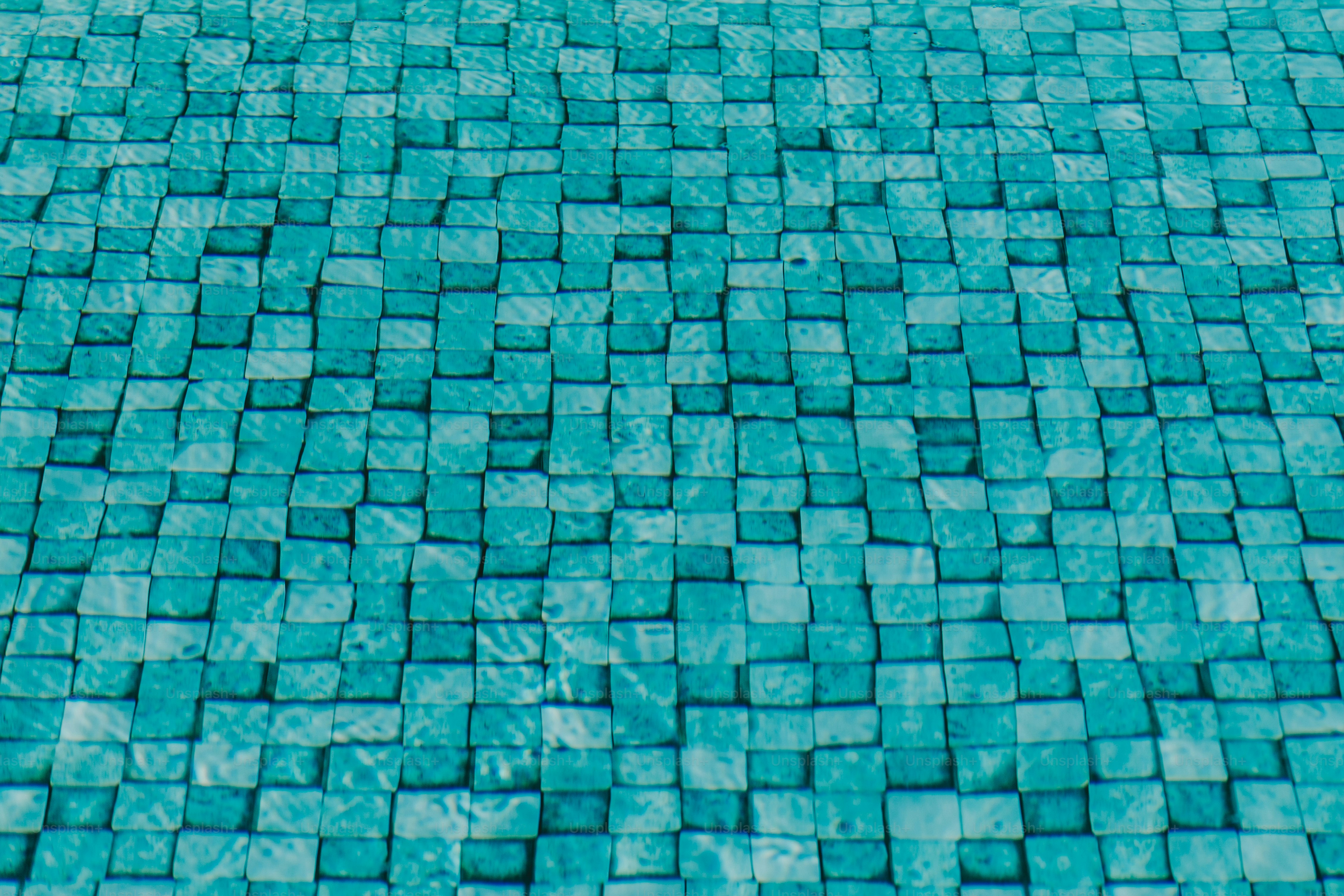 Turquoise tiles shimmer beneath rippling water. photo – Wallpaper Image ...