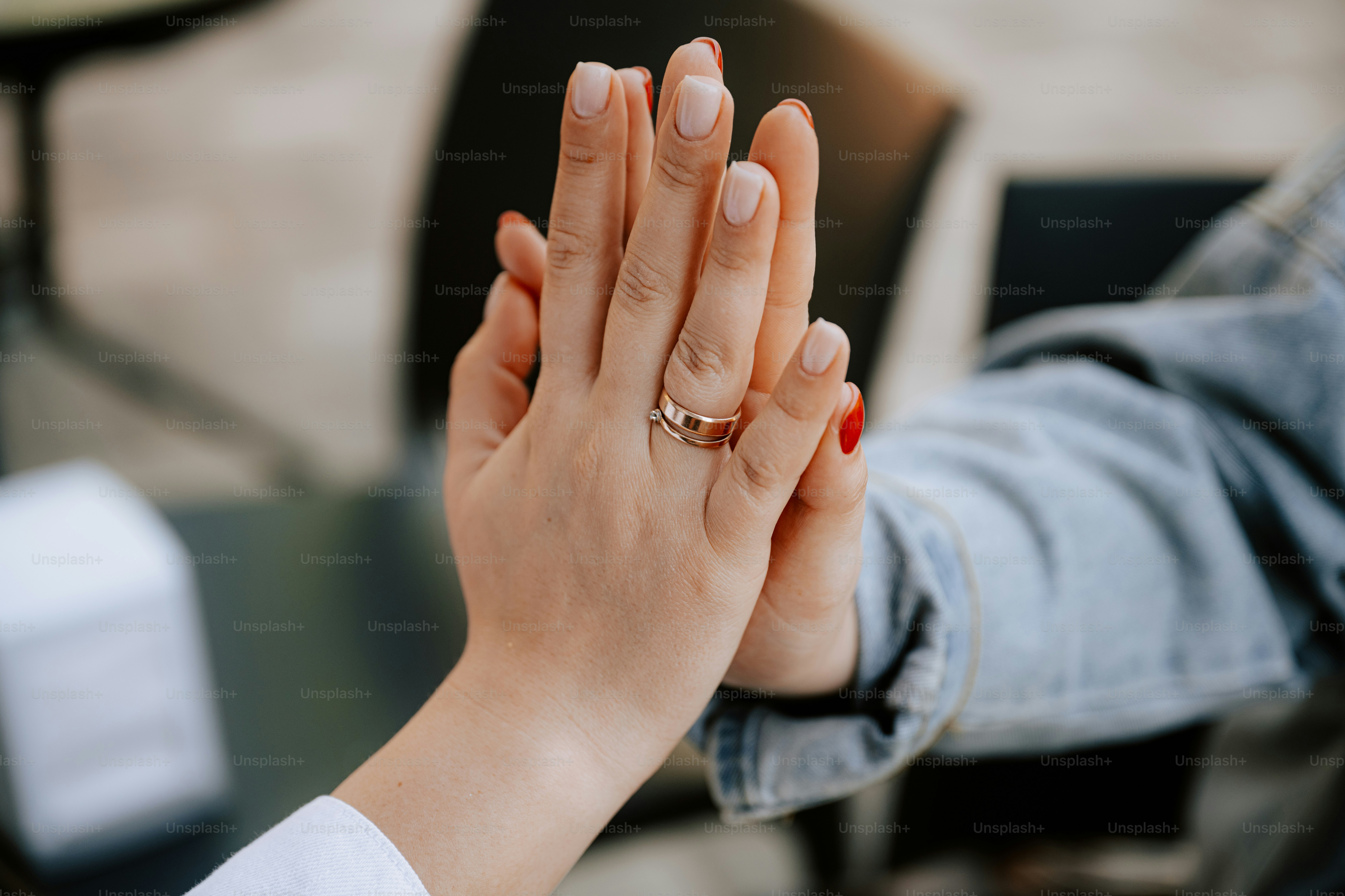 Hands touching, displaying an engagement ring. photo – Love Image on ...