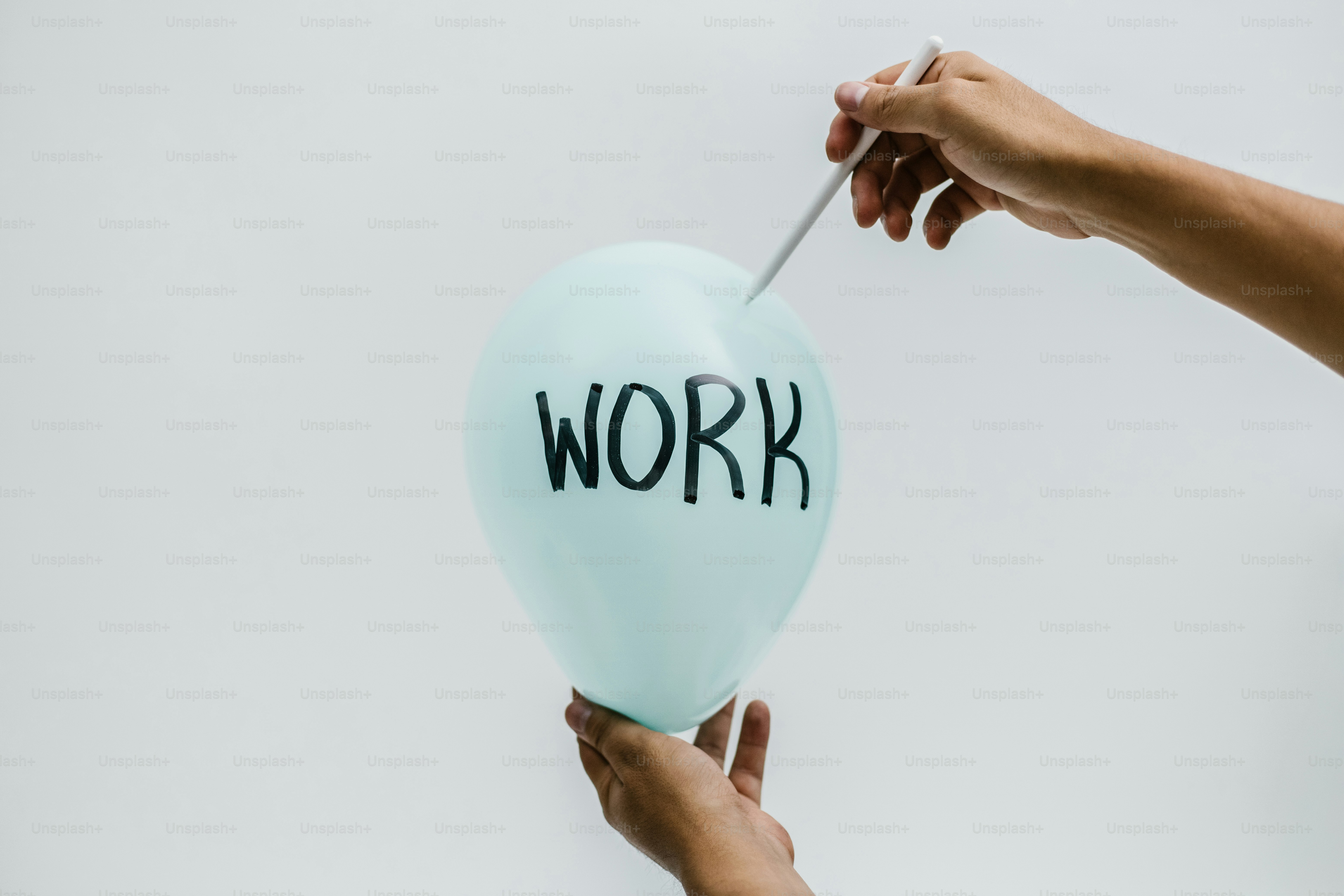 Someone is popping the "work" balloon. photo – Burnout Image on Unsplash