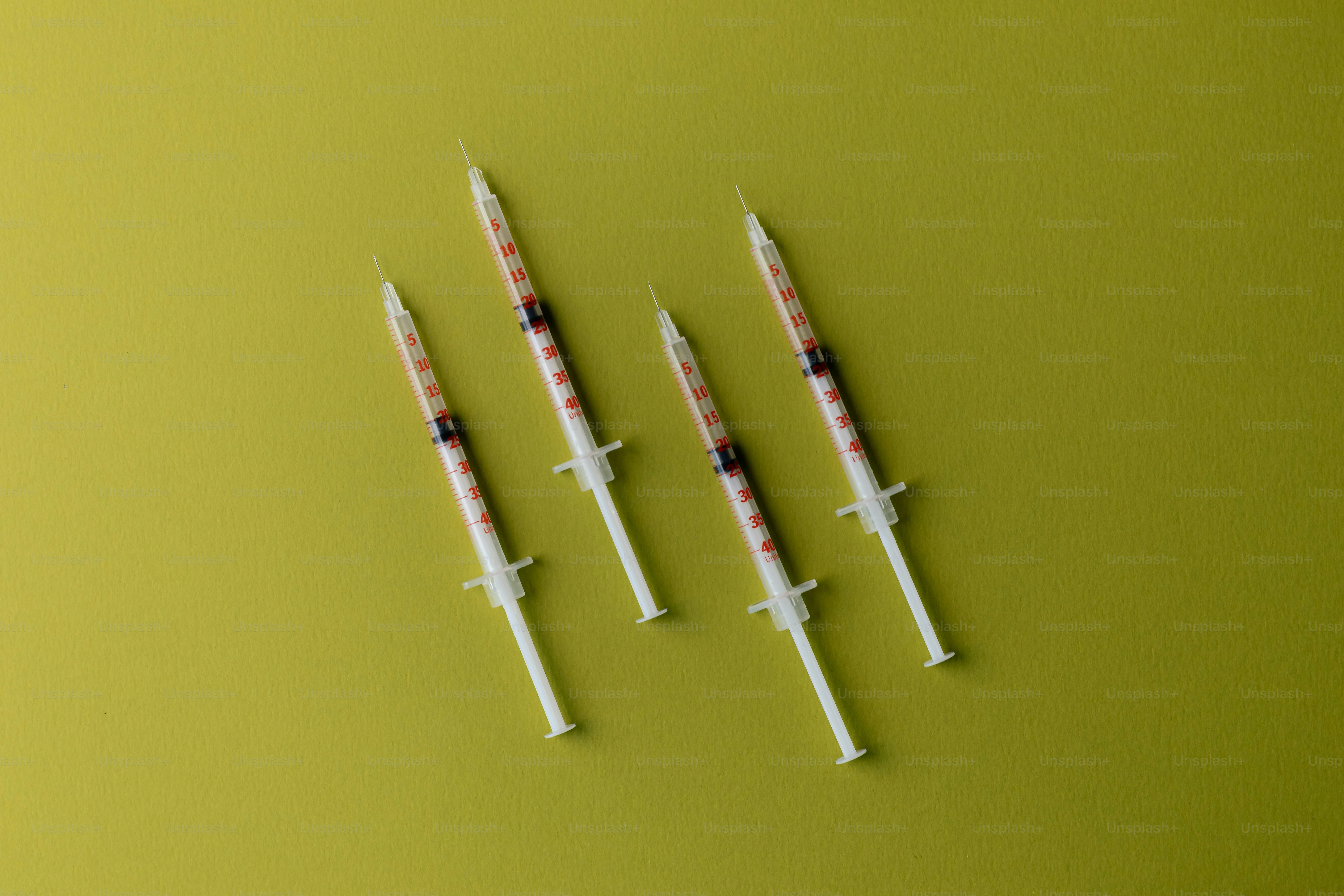 Three syringes with sharp needles are shown. photo – Health Image on ...