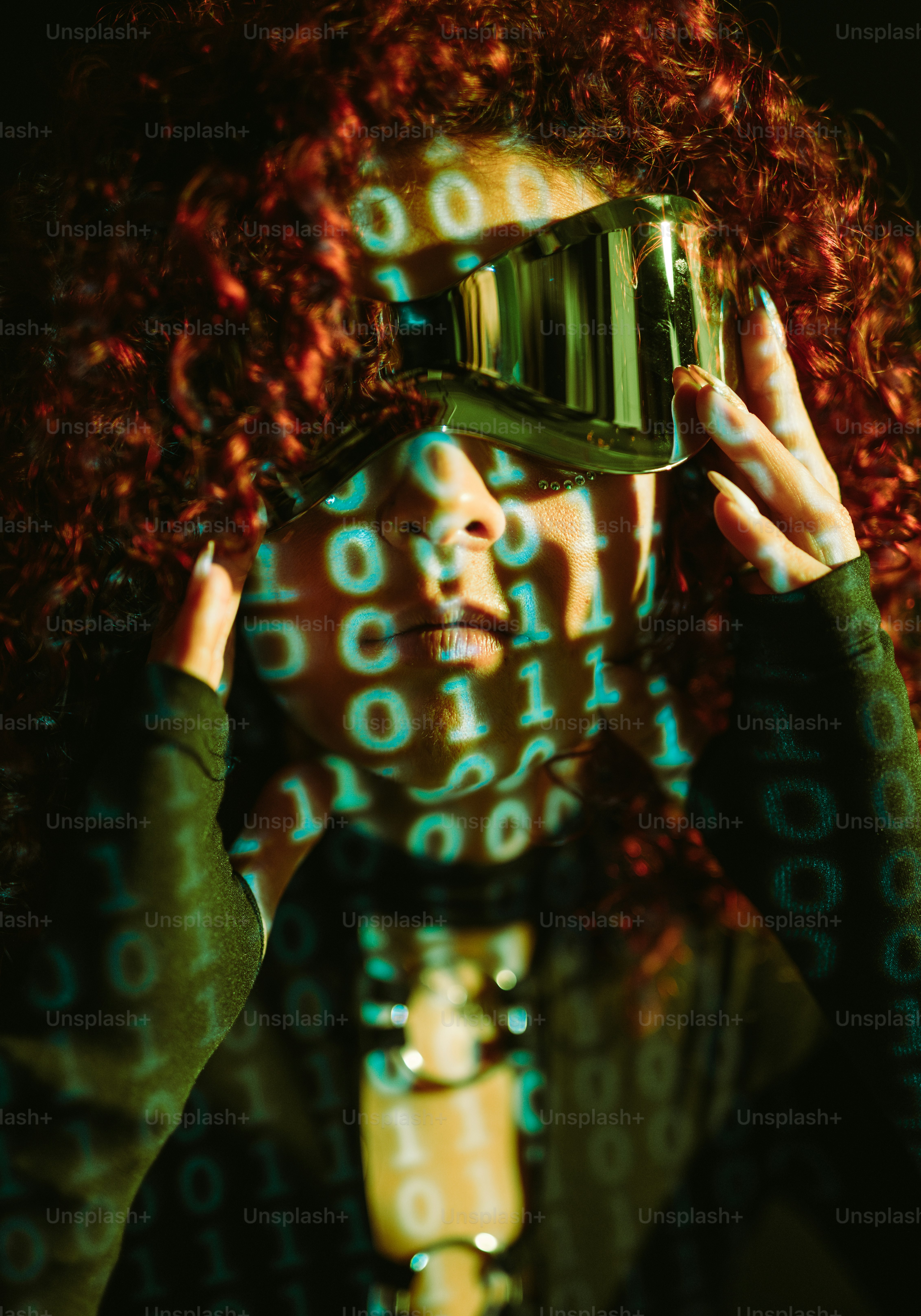 Woman wearing vr glasses with binary code projected. photo – Technology Image on Unsplash