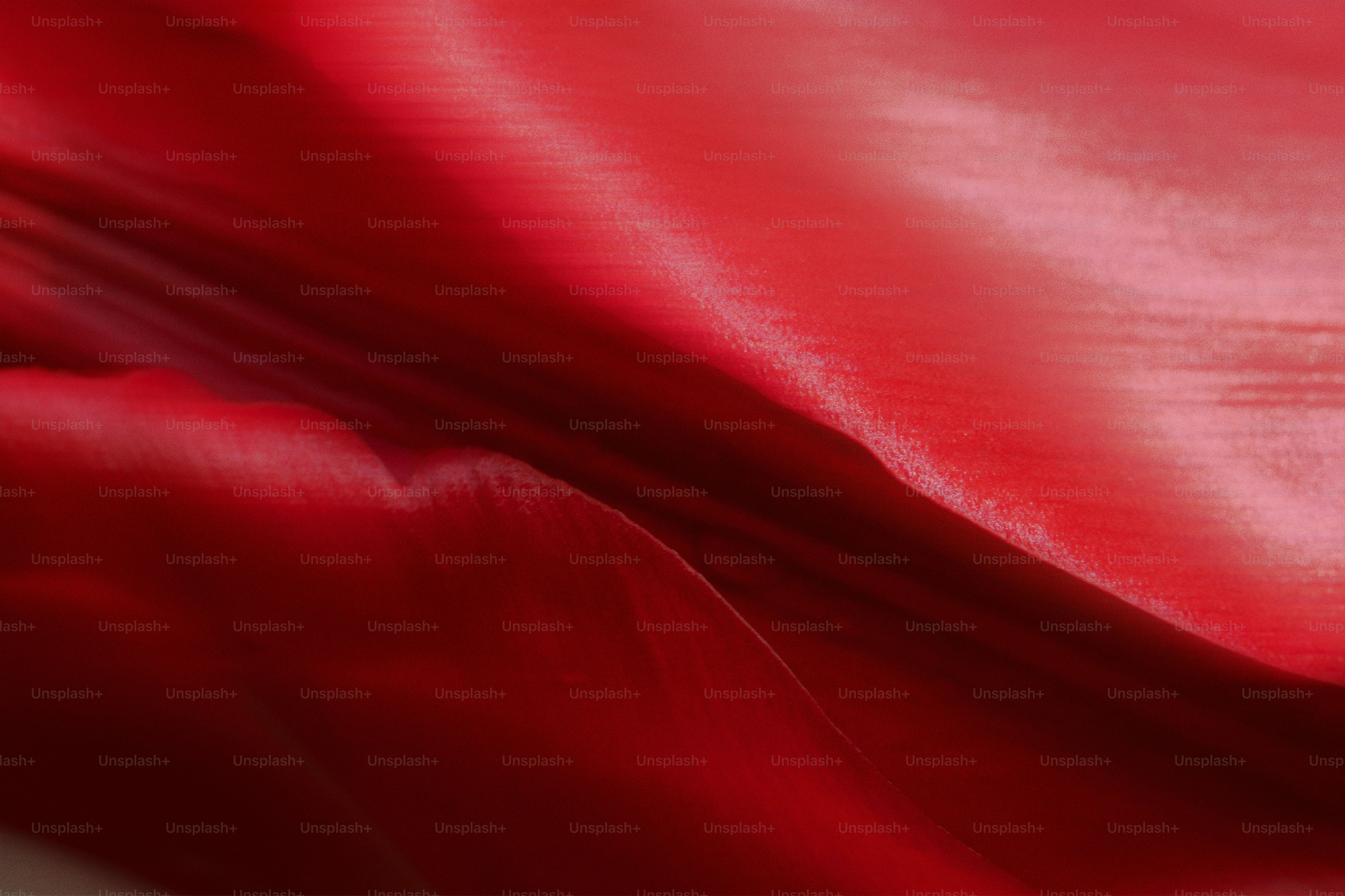 Red satin fabric waves and folds. photo – Wallpaper Image on Unsplash
