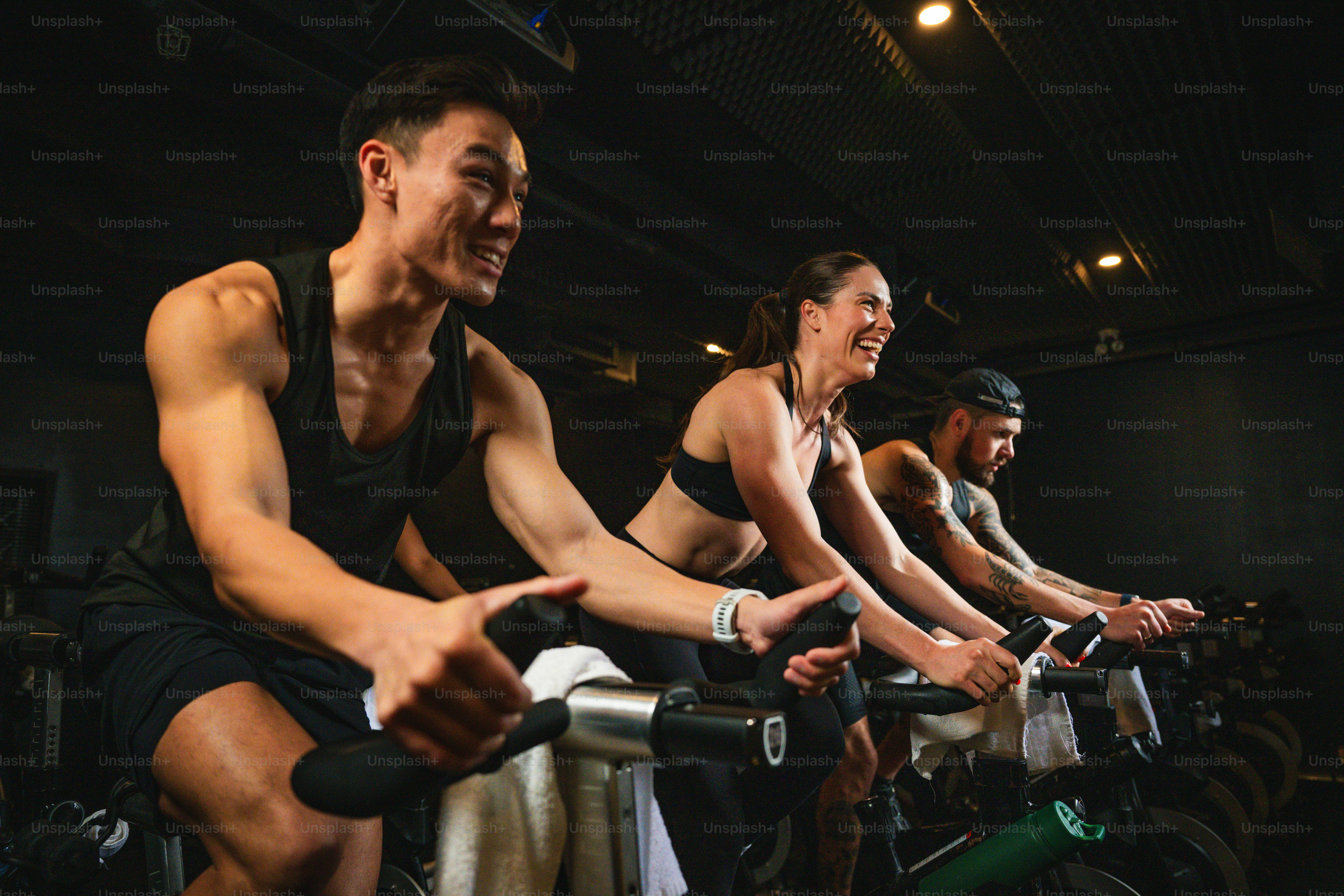 People are cycling and having fun at the gym. photo – Exercise Image on ...