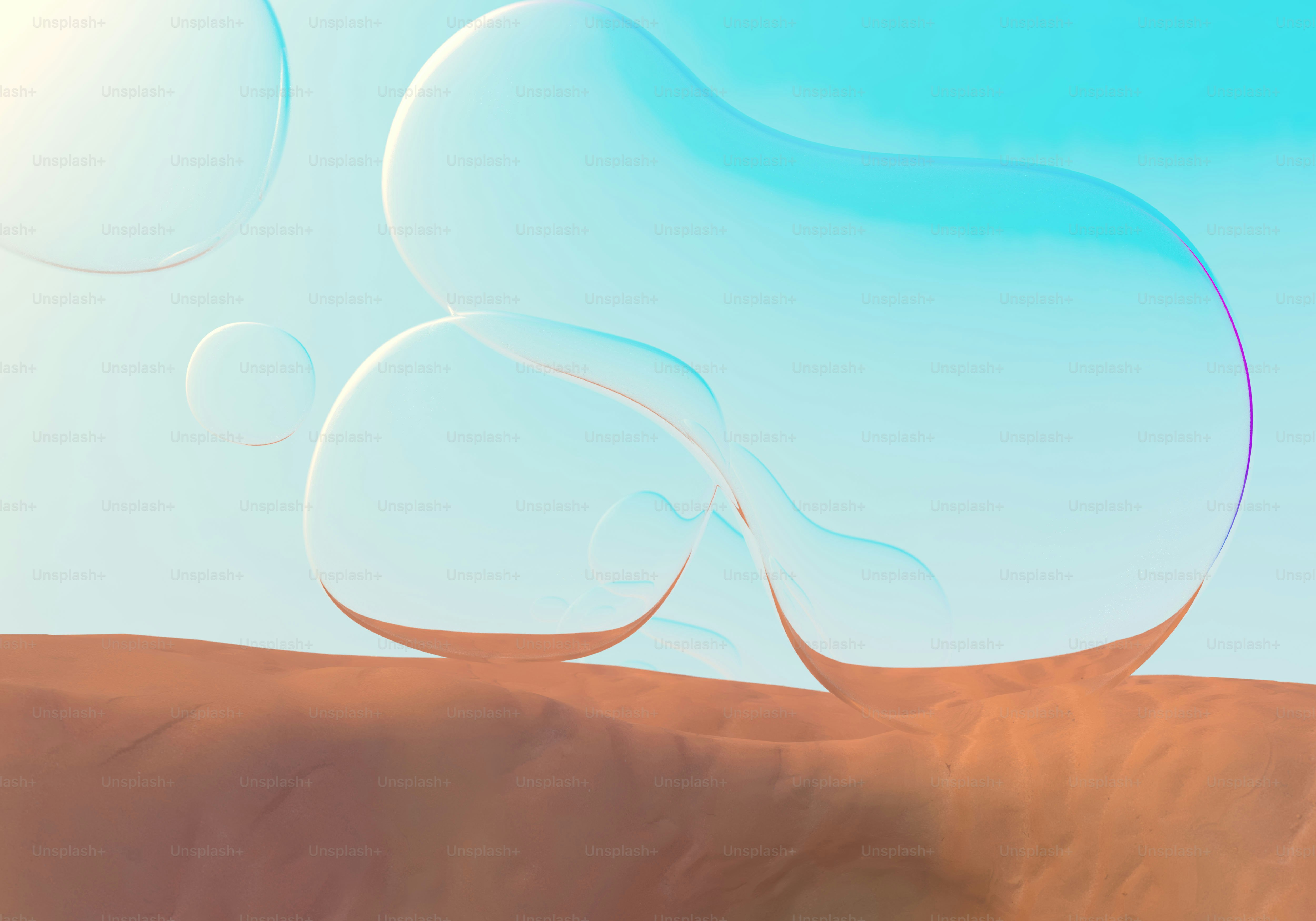 Bubbles float above a sandy surface. photo – Desert Image on Unsplash