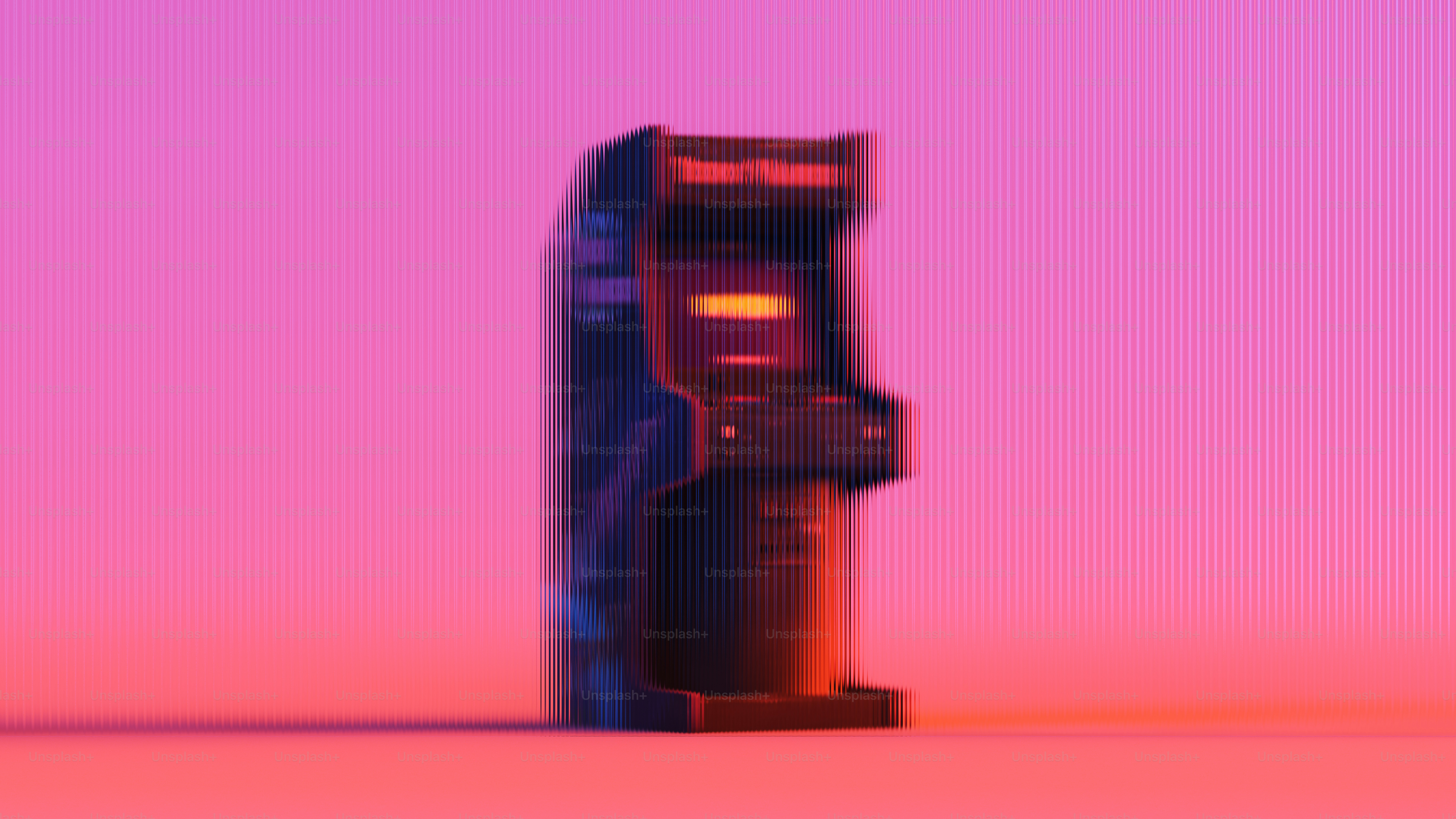An arcade machine stands in neon pink. photo – Pattern Image on Unsplash