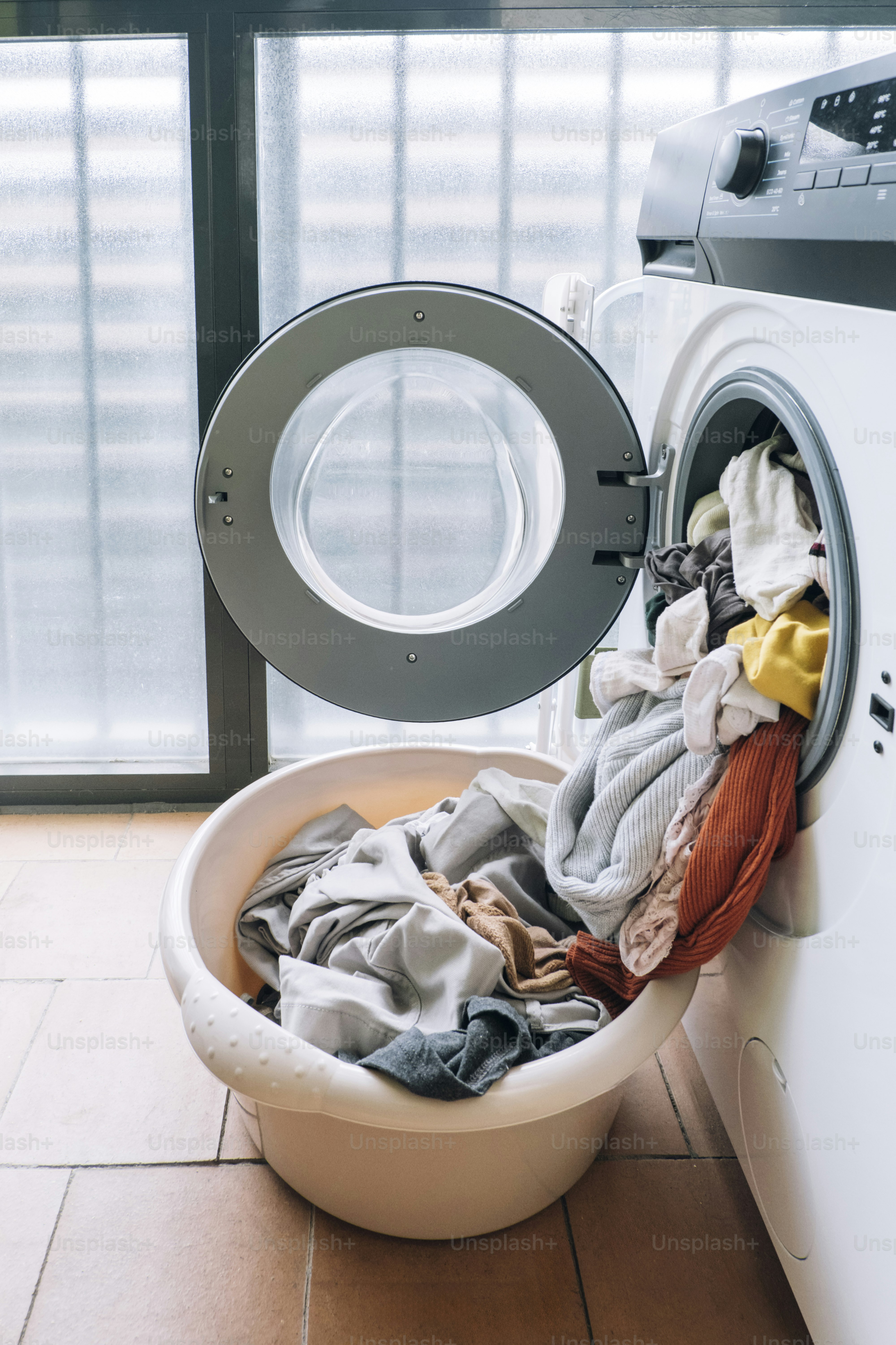 Laundry day: clothes ready for the wash cycle. photo – Laundry Image on ...