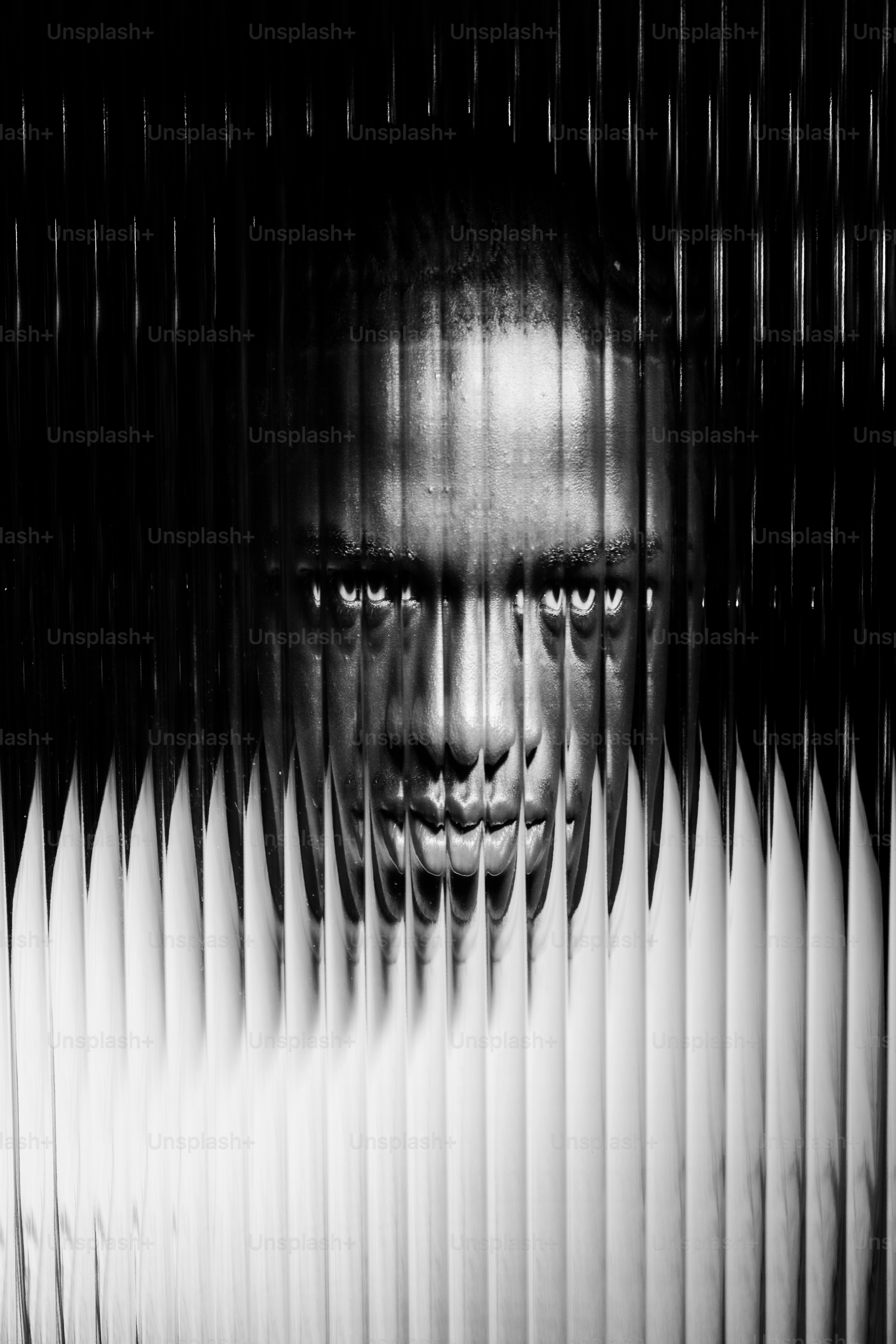 A person's face is distorted by vertical lines. photo – Portrait Image ...