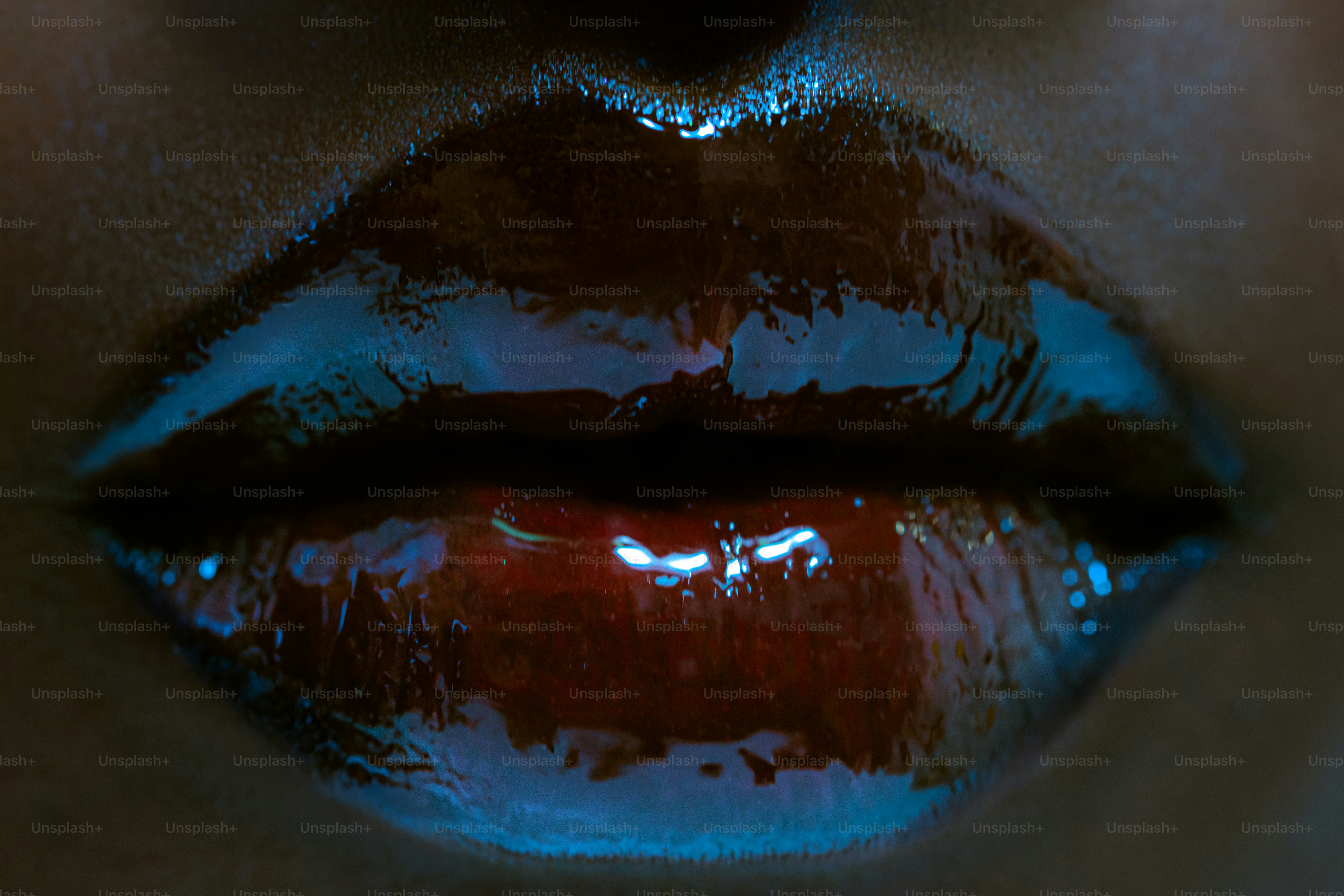 Glossy lips shimmer in a close-up shot. photo – Beauty Image on Unsplash