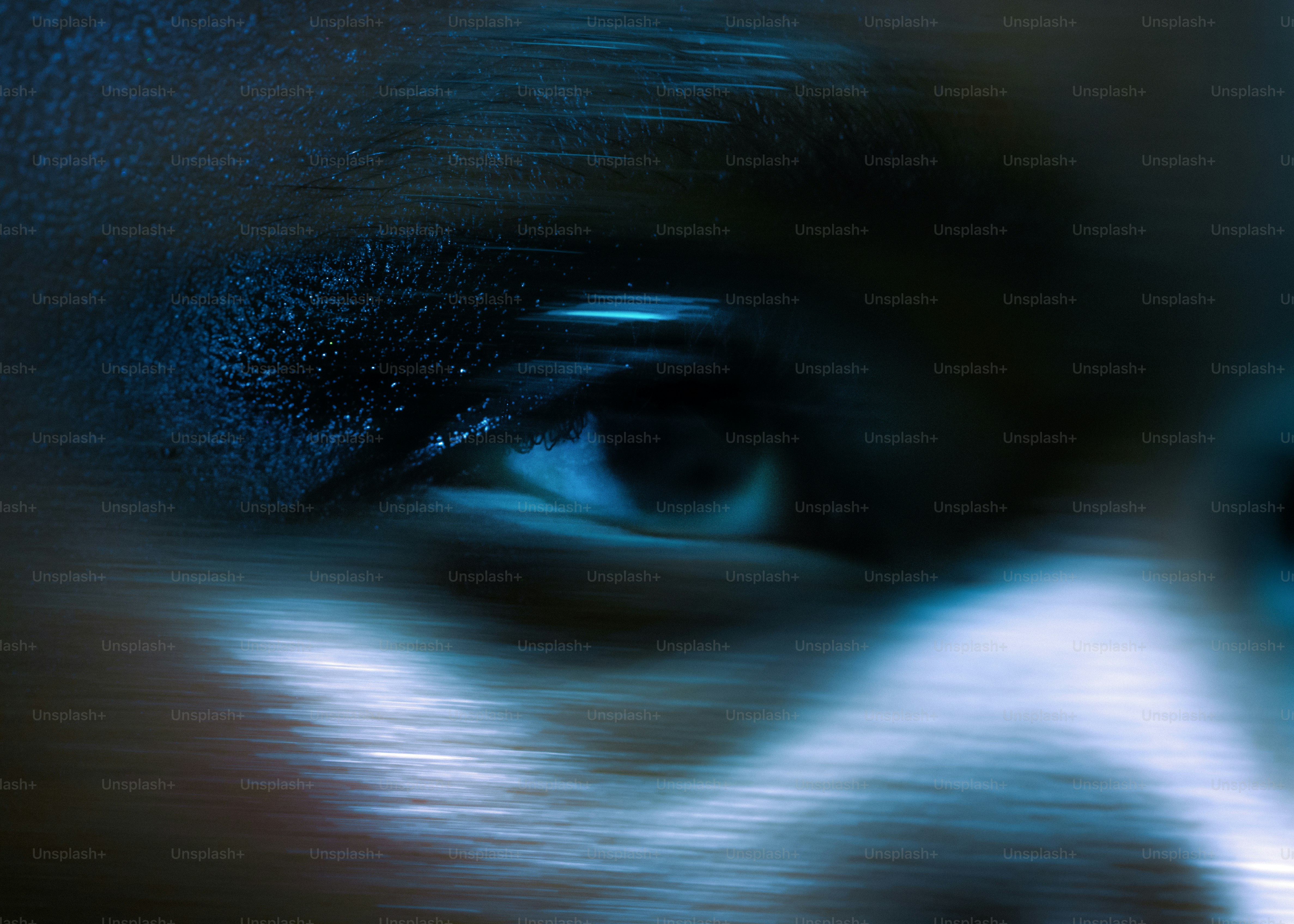 A close-up of a human eye in blue lighting. photo – Beauty Image on ...