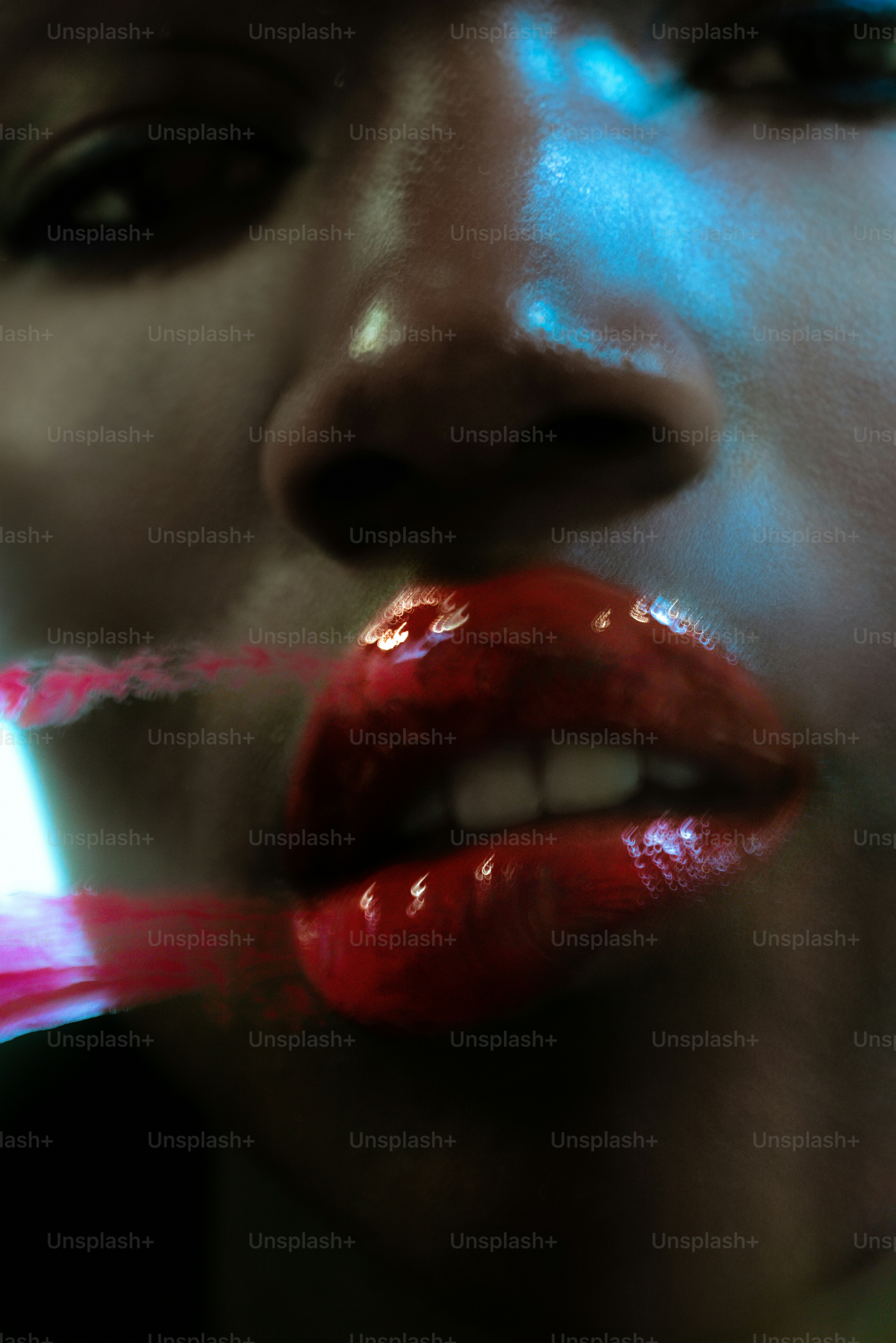 Red lipstick and blurred color detail a close-up. photo – Beauty Image ...